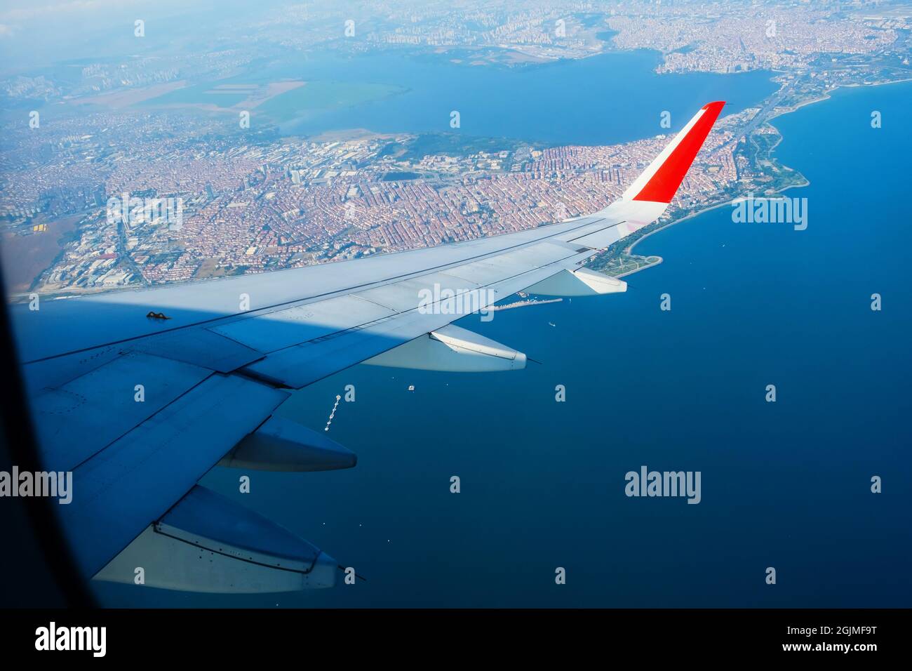Looking through window aircraft during flight in wing lands over ...