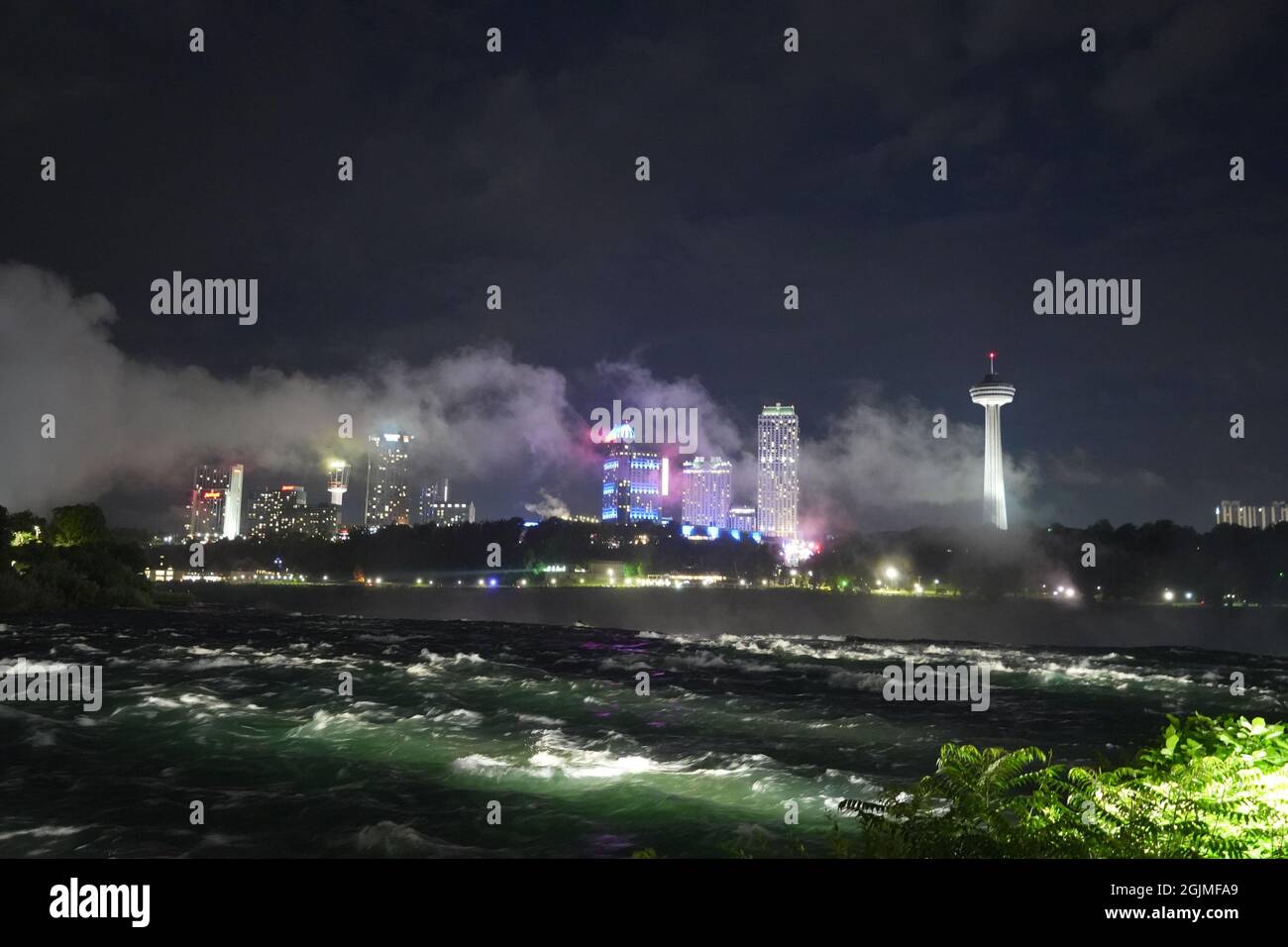 Niagara Falls at night. Breathtaking view with multi colored light show ...