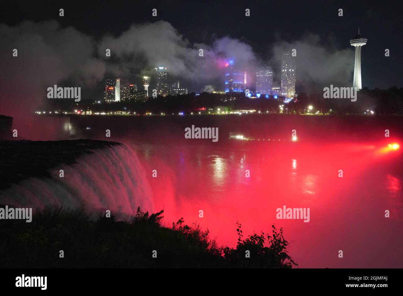 Niagara Falls at night. Breathtaking view with multi colored light show ...