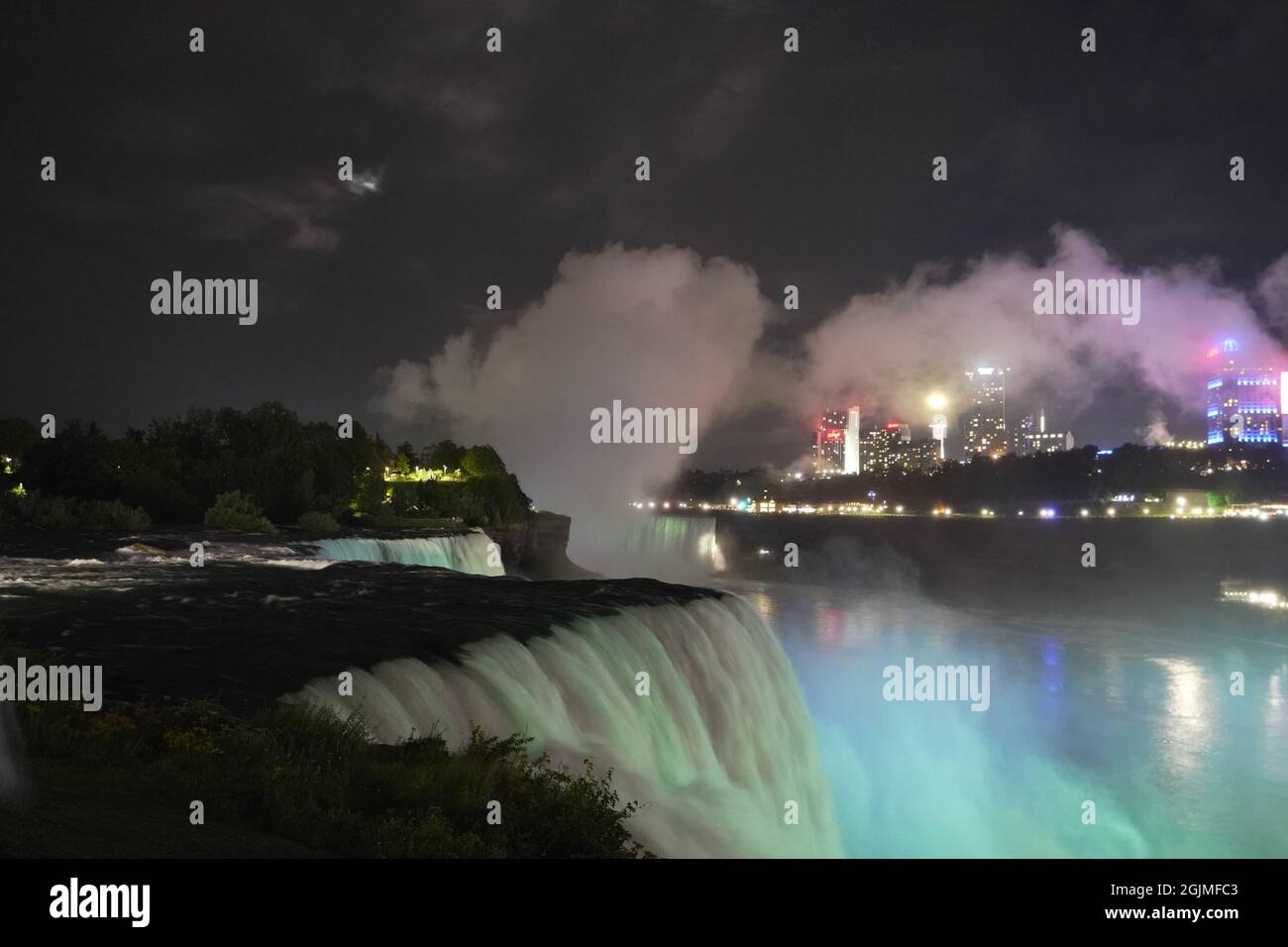 Niagara Falls at night. Breathtaking view with multi colored light show ...