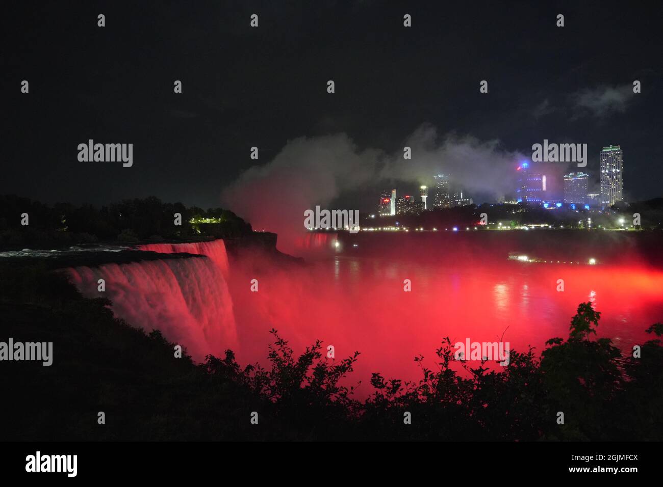 Niagara Falls at night. Breathtaking view with multi colored light show ...