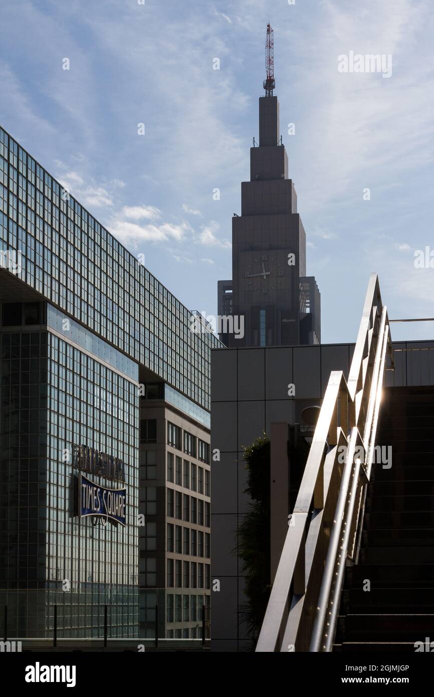 The NTT Docomo Yoyogi Building towers behind Takashimaya Times Square ...