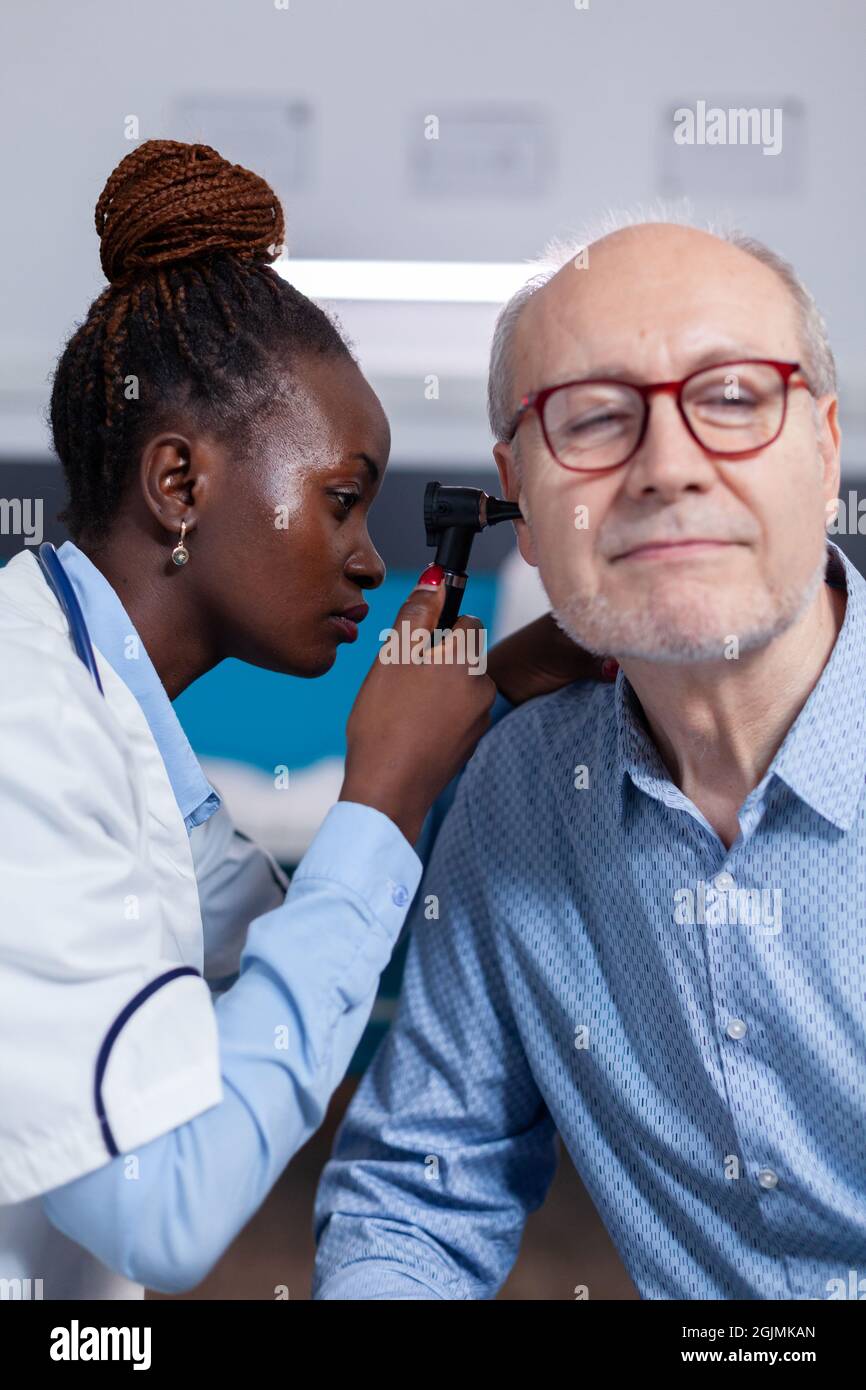 Ear checkup hi-res stock photography and images - Alamy