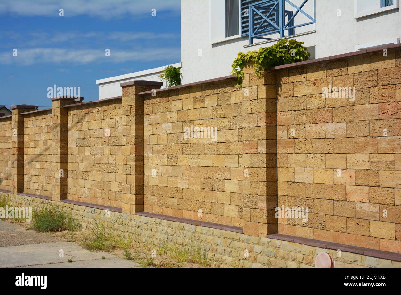 Beautiful Coquina, Shelly Limestone Fence Wall. Natural Stone Fencing ...