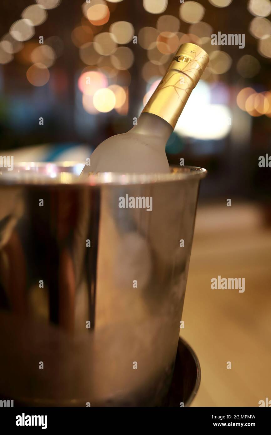 Bottle of vodka in ice bucket in restaurant Stock Photo - Alamy