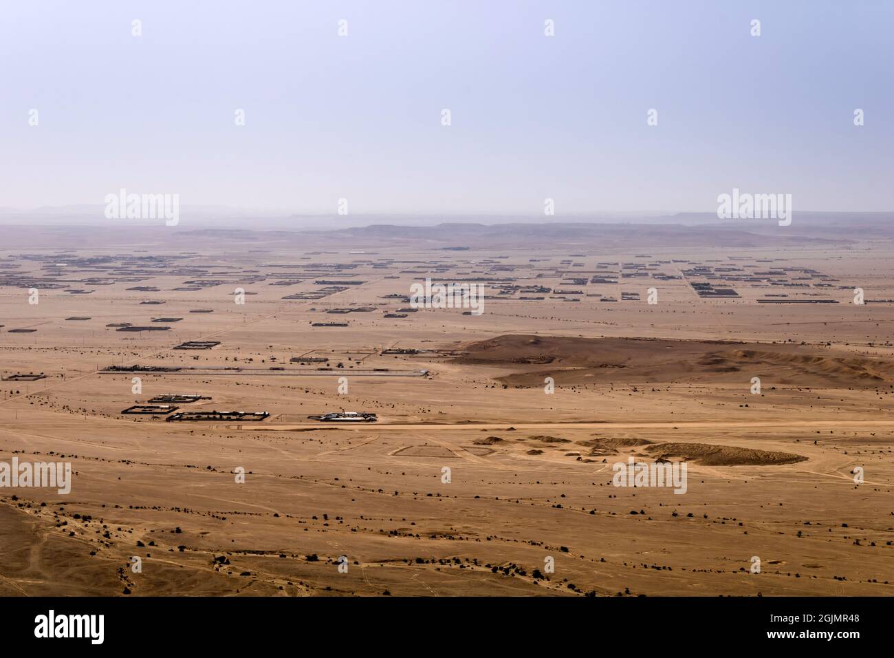 A desert landscape viewed from the Natural Arch of Riyadh. A plain ...