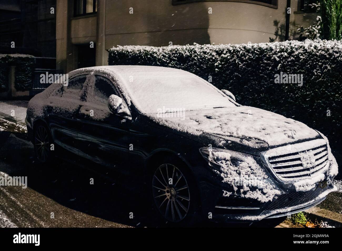 Side view of Covered with snow luxury limousine Mercedes-Benz S-Klasse ...