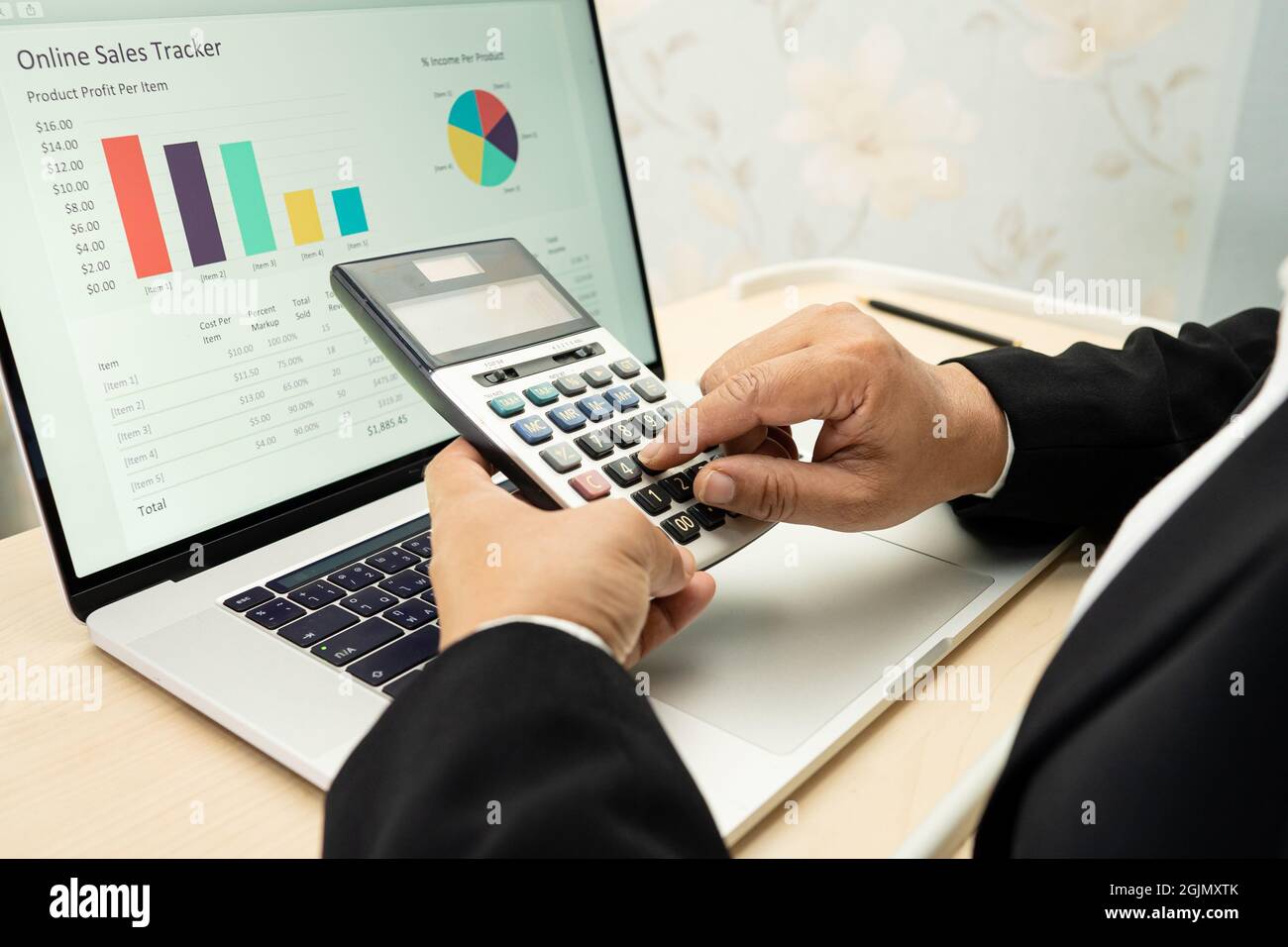 Asian accountant working and analyzing financial reports project ...