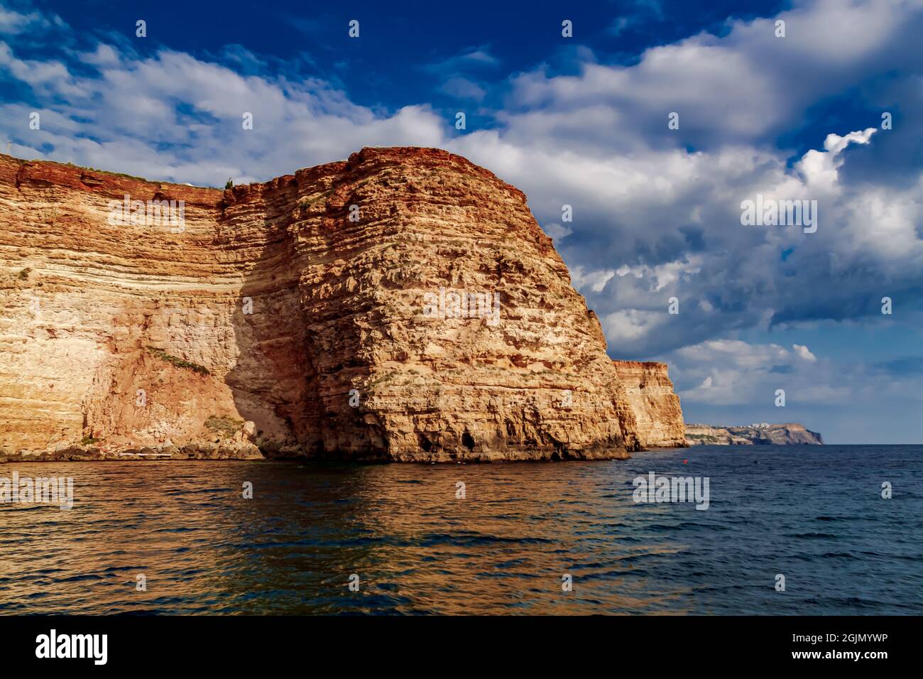 Black Sea red rocks coastline. Coastal red rocks and blue sea. Seascape ...