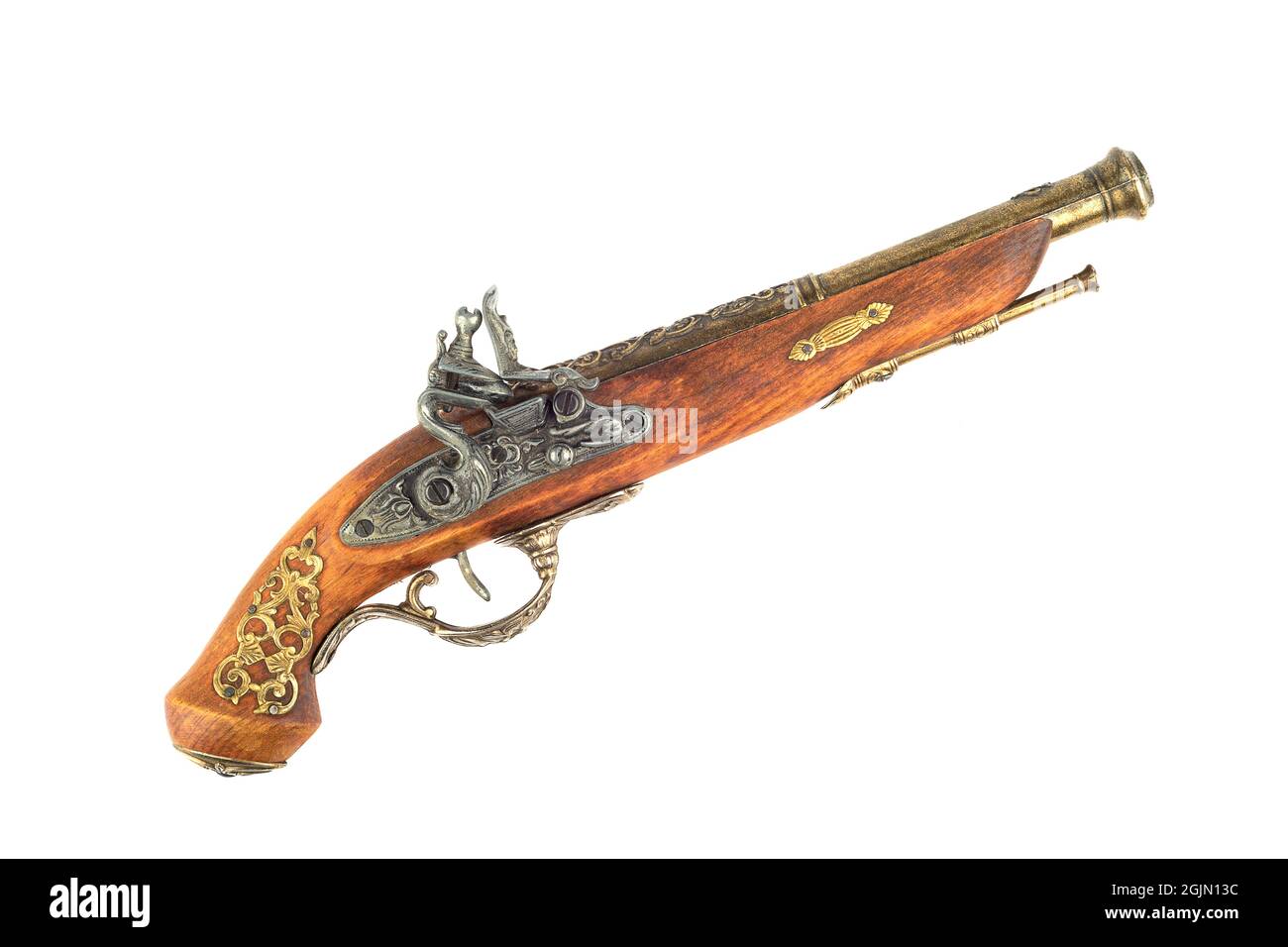 Old antique firearm with bronze inlay isolated on white background ...