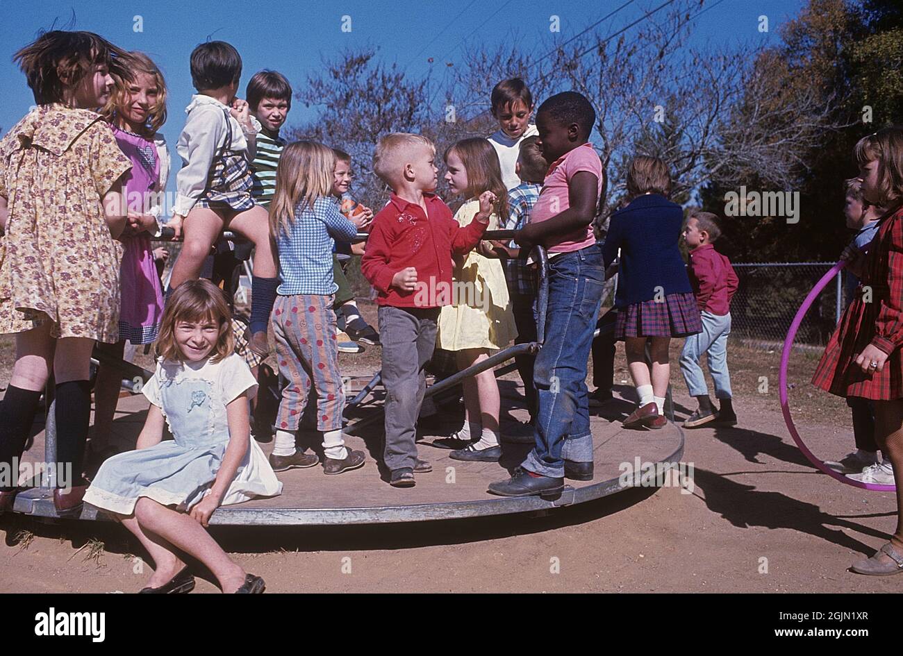 USA Alabama 1966. Scene from a local playground where the children are ...