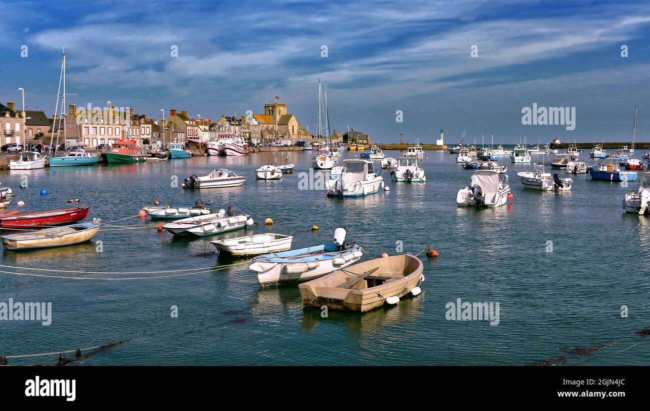 Small boats and ships in the port of Barfleur, a commune in the ...