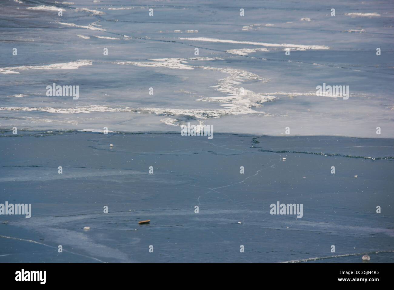 Miles of ice covering a lake during a very cold deep freeze Stock Photo ...
