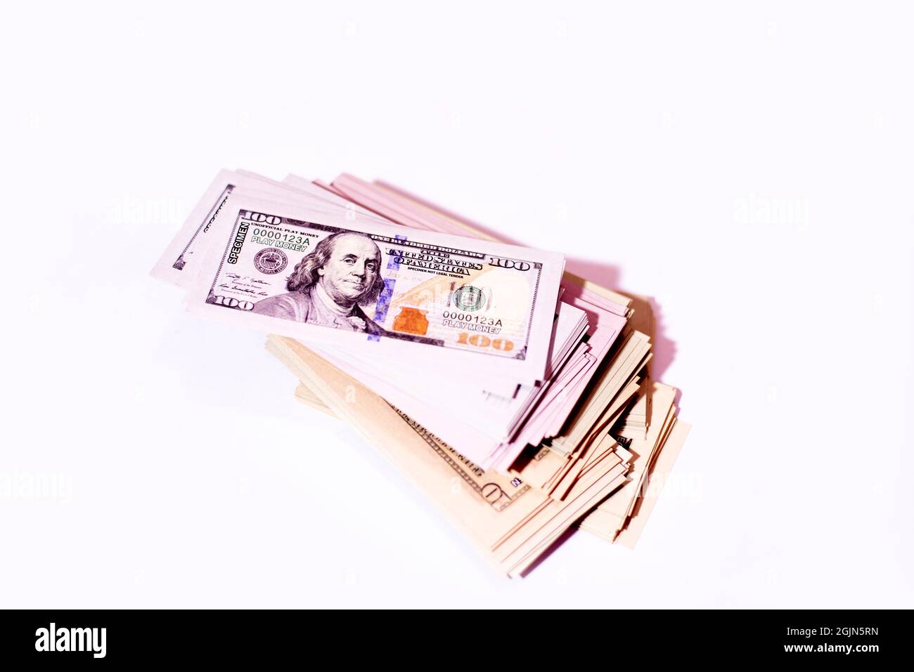 Stack of us one hundred dollar paper currency isolated on white ...