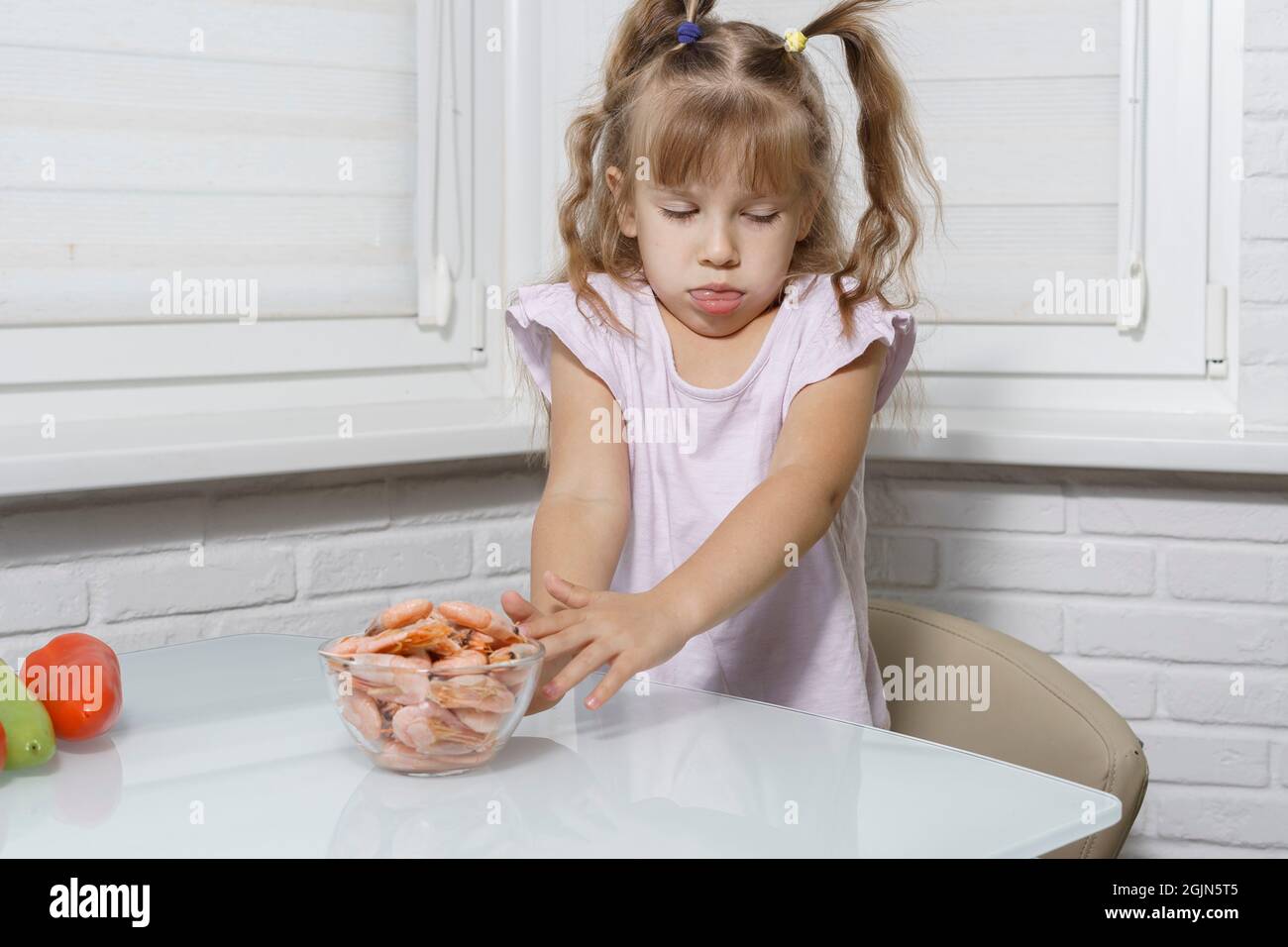 Person refusing to eat fish hi-res stock photography and images - Alamy