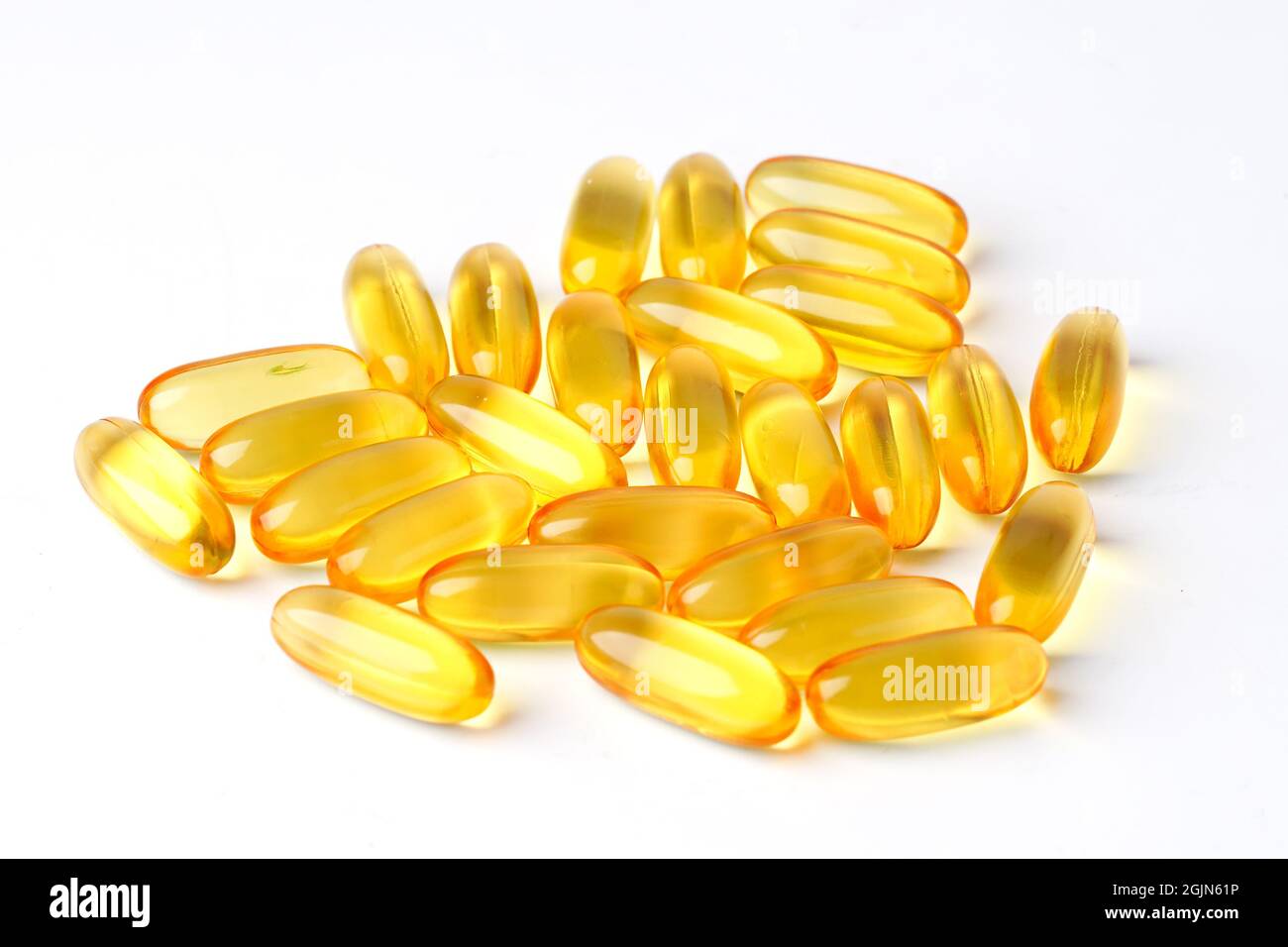 Fish oil pill capsule isolated on white background Stock Photo - Alamy