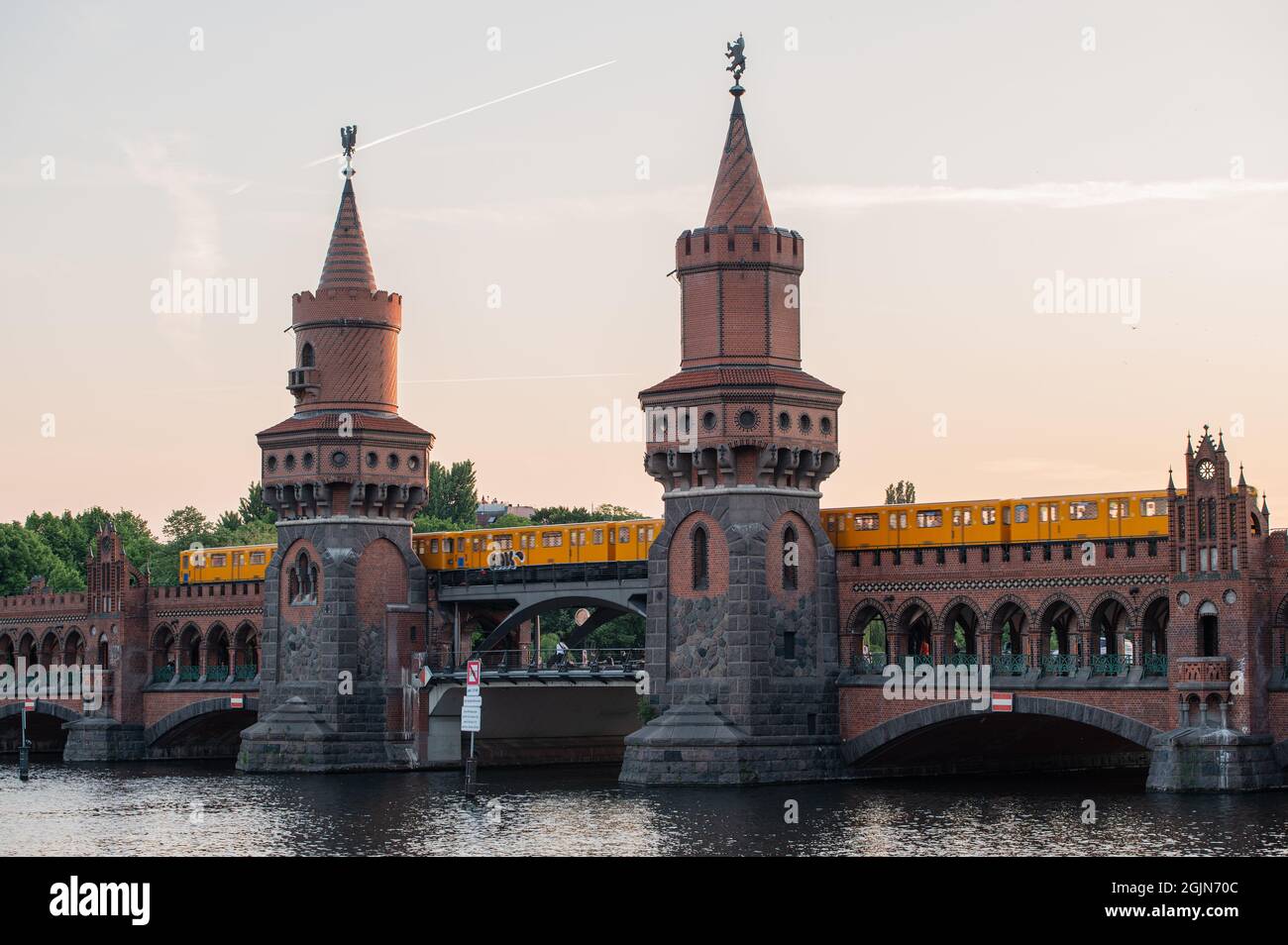 Oberbaum bridge with moving underground at dusk Stock Photo - Alamy
