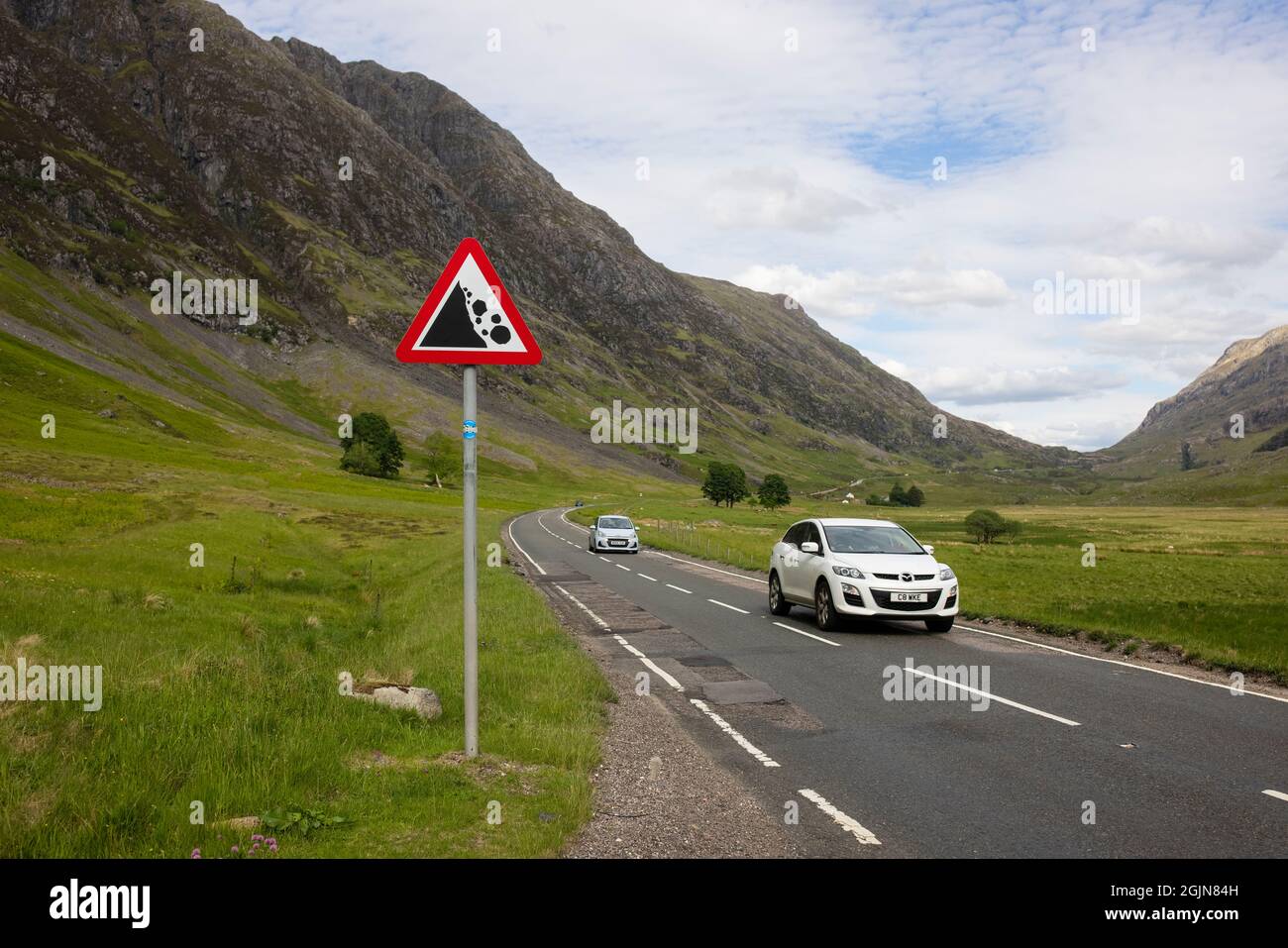 Risk of falling or fallen rocks ahead sign, Gelncoe, Scotland Stock ...