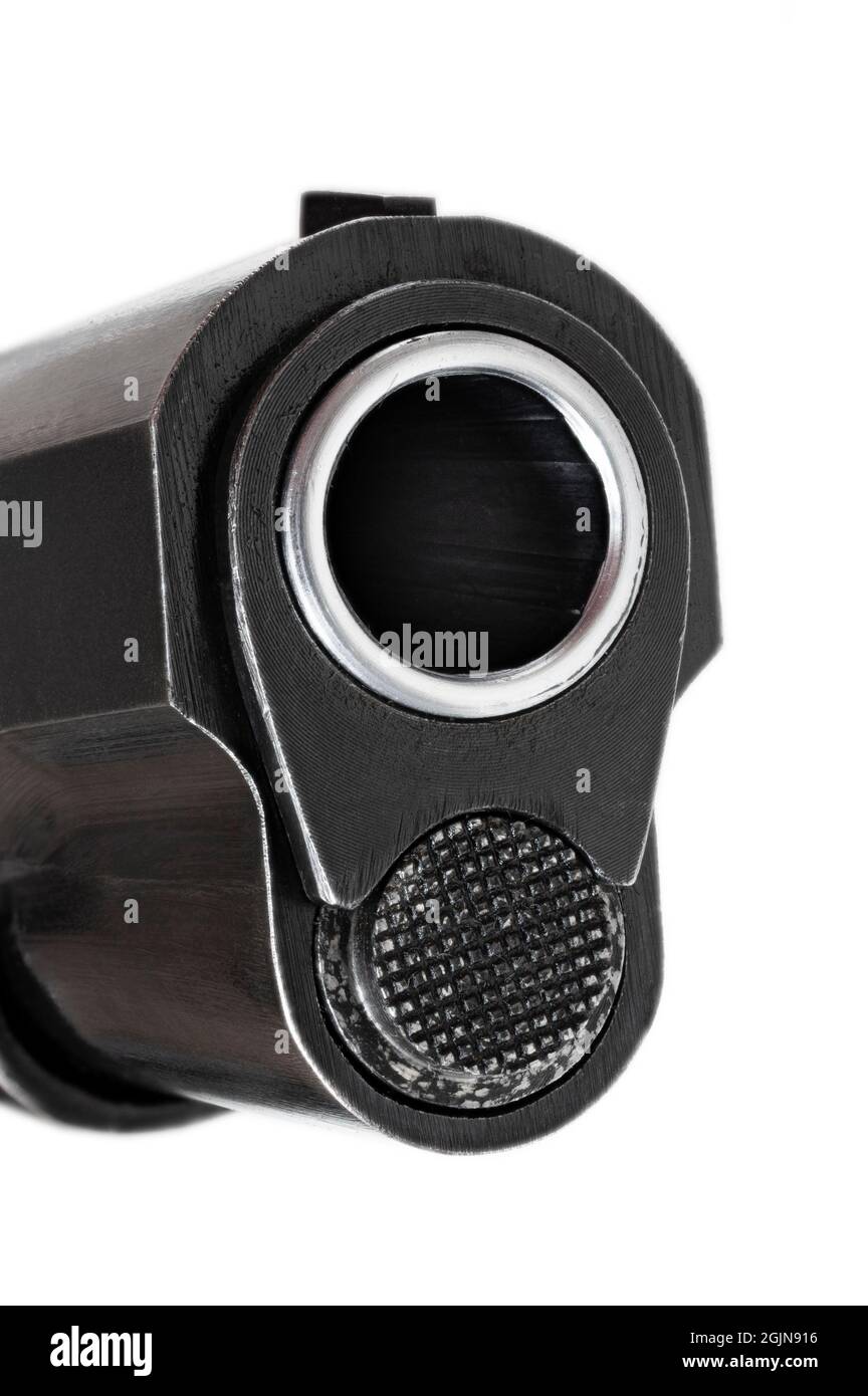 Barrel of a handgun pointing toward the camera isolated on white Stock ...