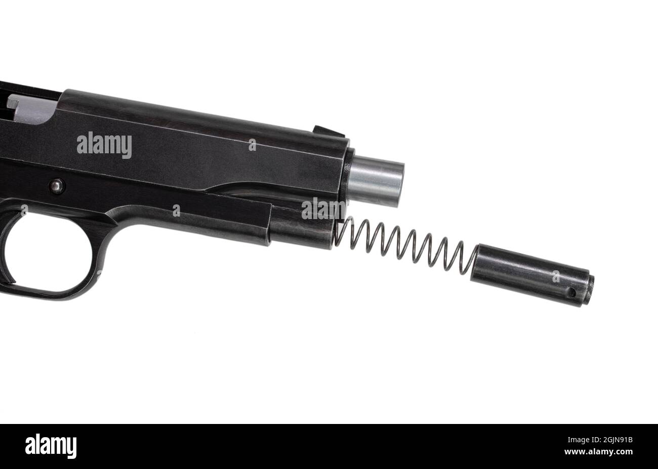 Semi-automatic handgun spring and plunger coming out to remove the ...