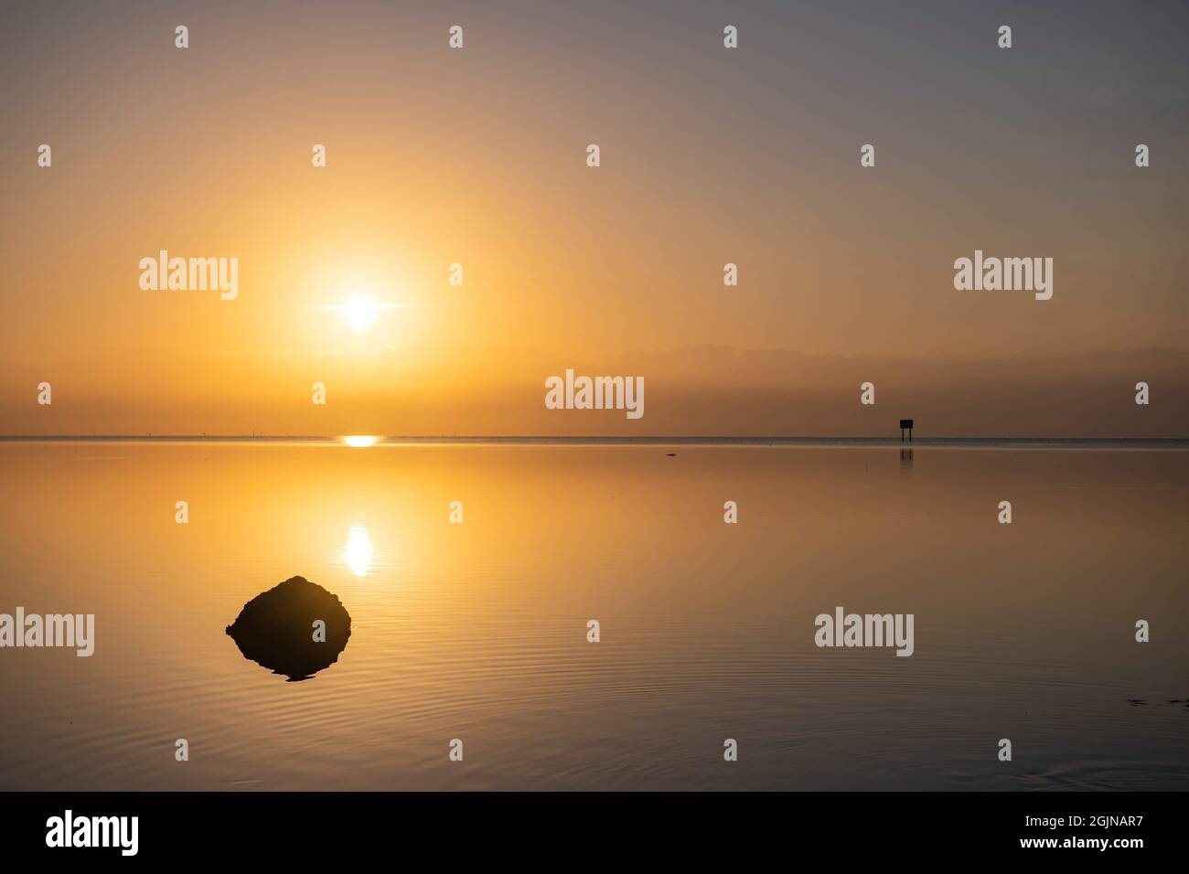 Beautiful sunset over the sea Stock Photo - Alamy