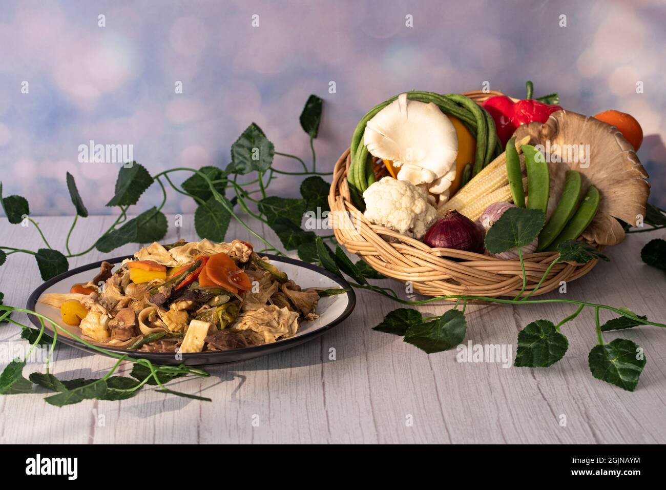 A serving of chop suey or chop choy with the raw ingredients in a ...