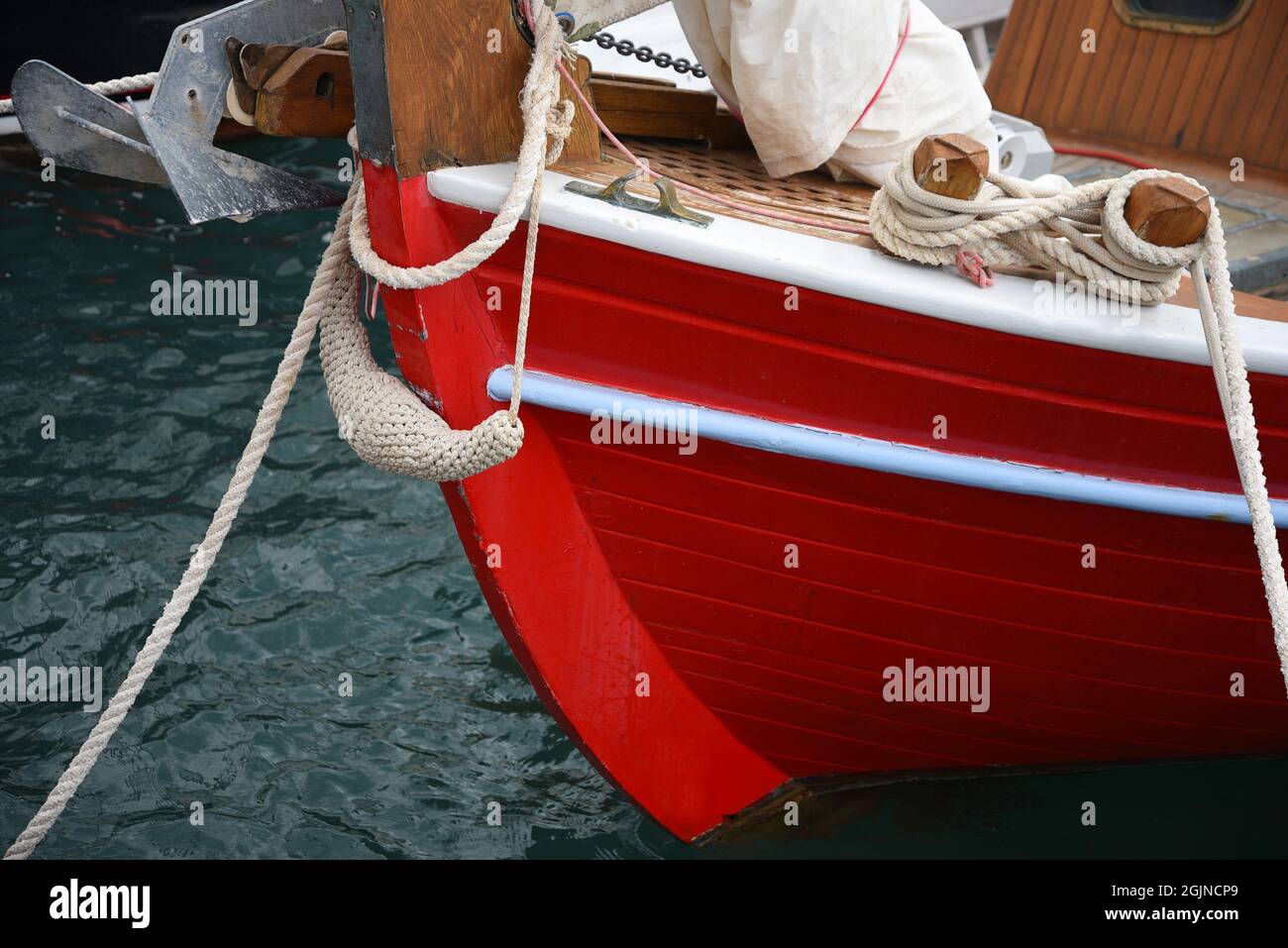 Landscape with scenic view of a traditional Greek fishing boat bow on ...