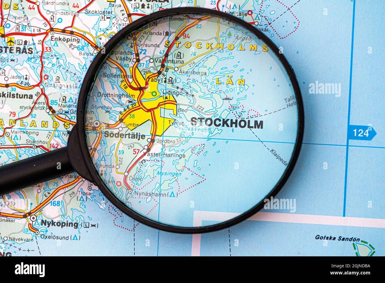 map of Stockholm in Sweden through magnifying glass, concept of ...
