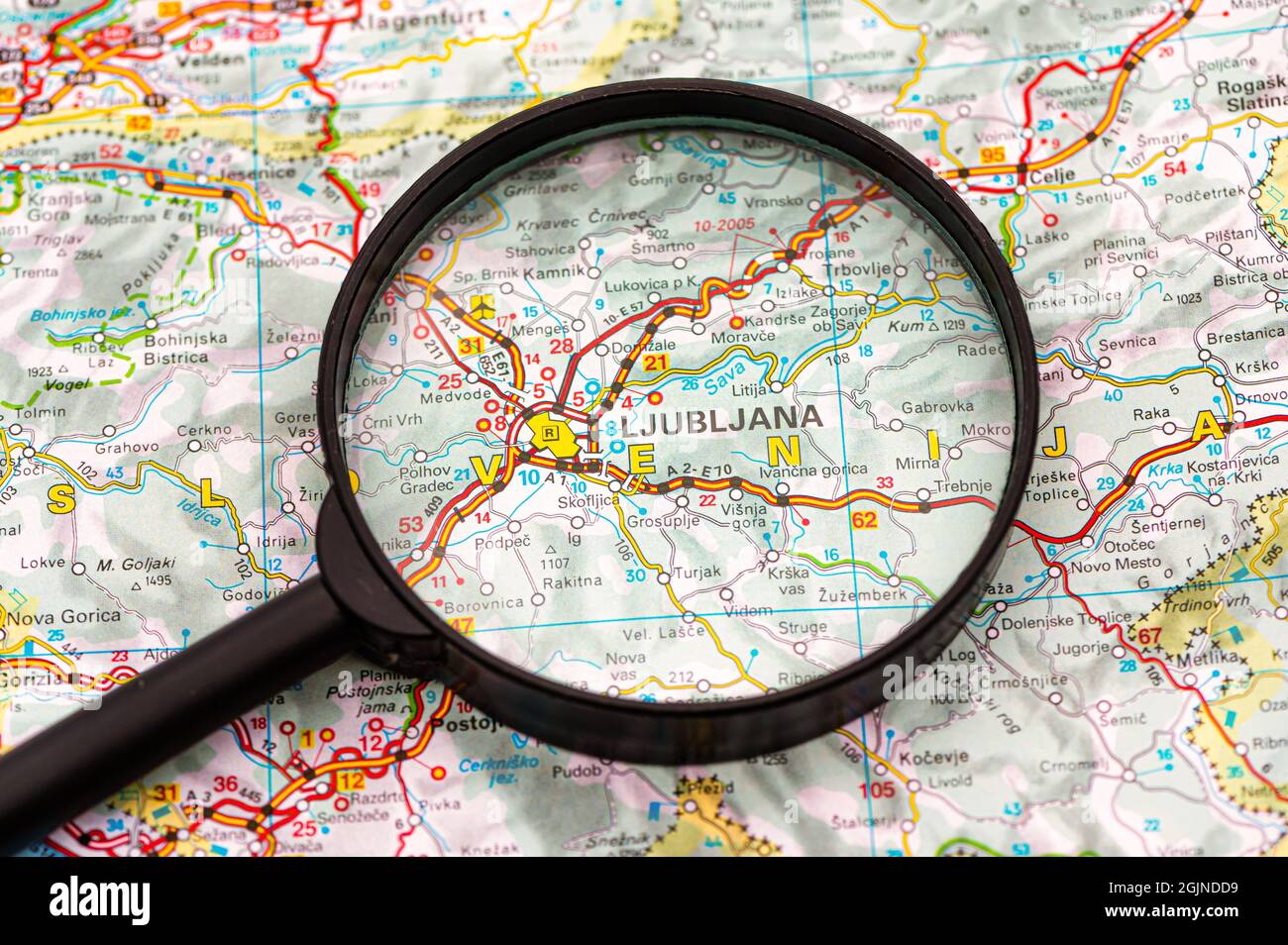 map of Ljubljana in Slovenia through magnifying glass, concept of ...