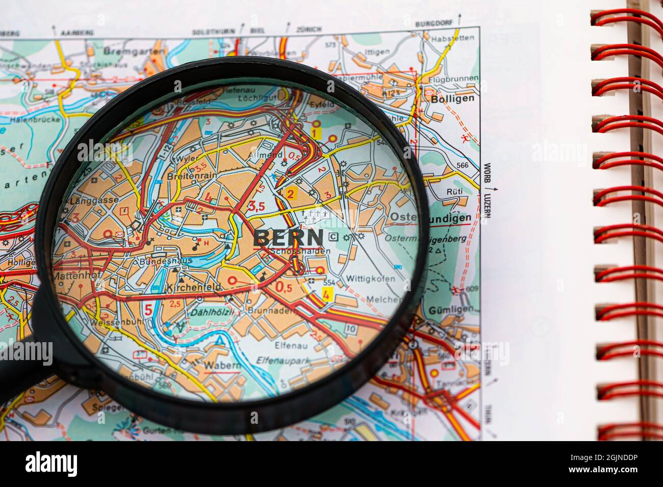 map of Bern in Switzerland through magnifying glass, concept of ...