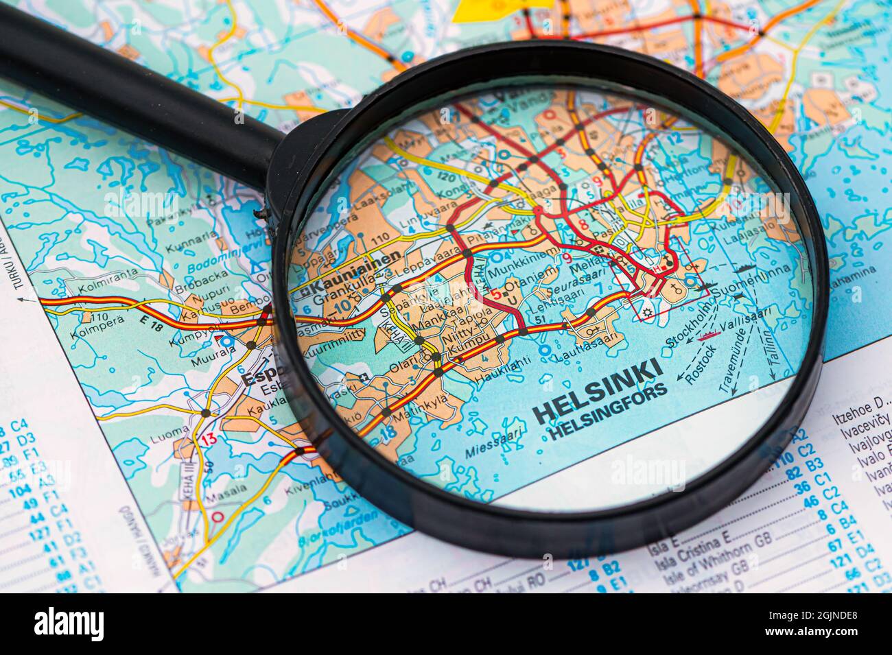map of Helsinki in Finland through magnifying glass, concept of ...