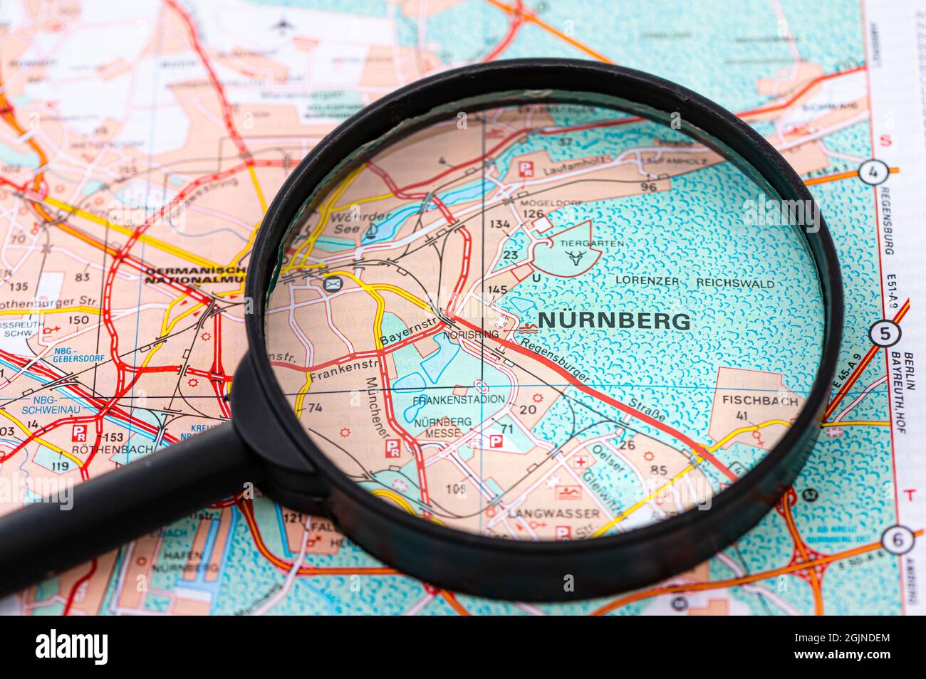 map of Nurnberg (Nuremberg) in Germany through magnifying glass ...