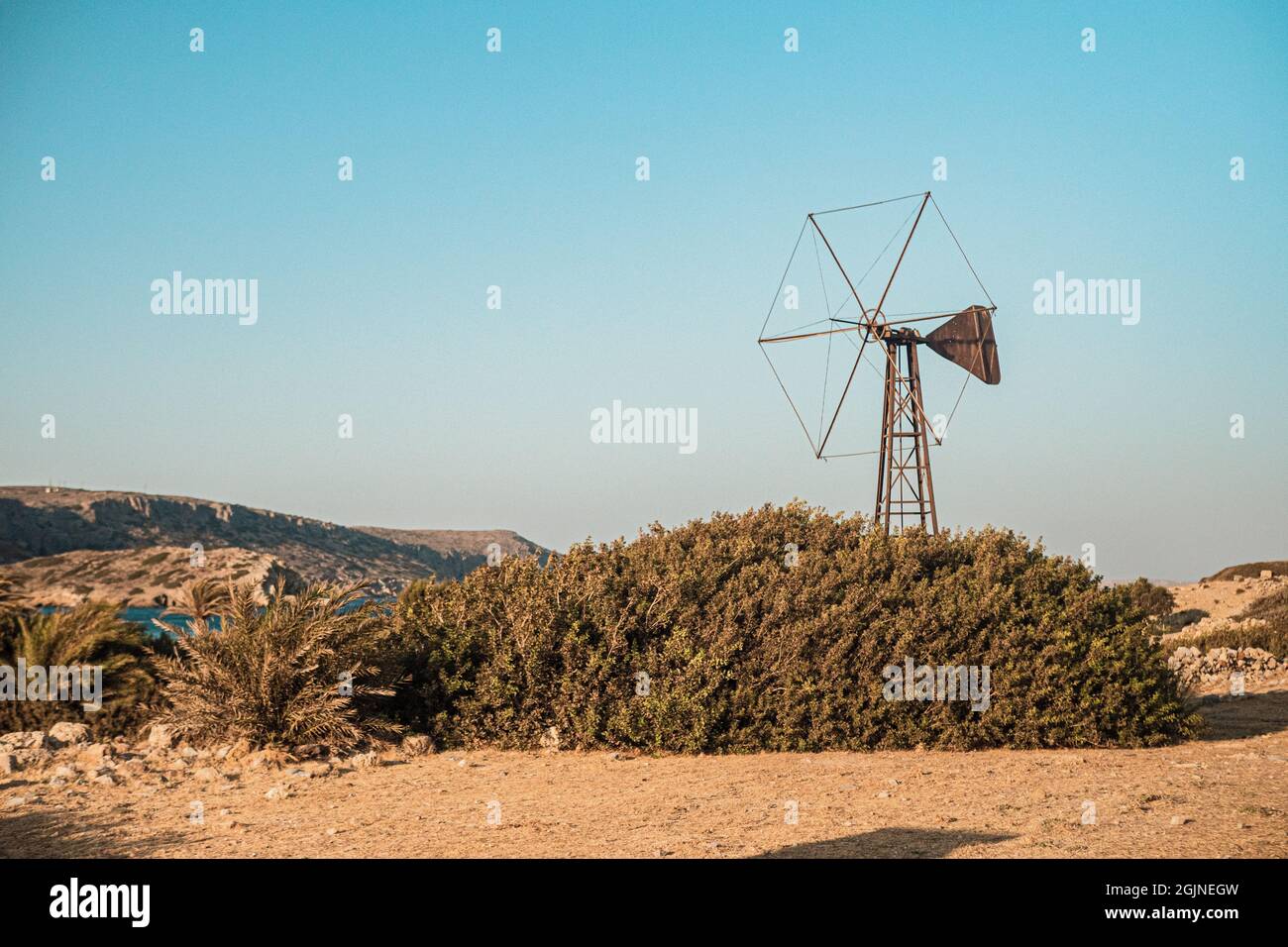 Landscape of Crete with an old windmill Stock Photo - Alamy
