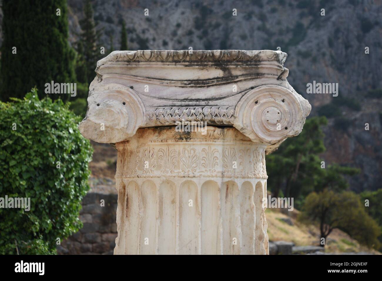 Ancient marble sculpted Ionic order column fragment in Temple of Apollo ...