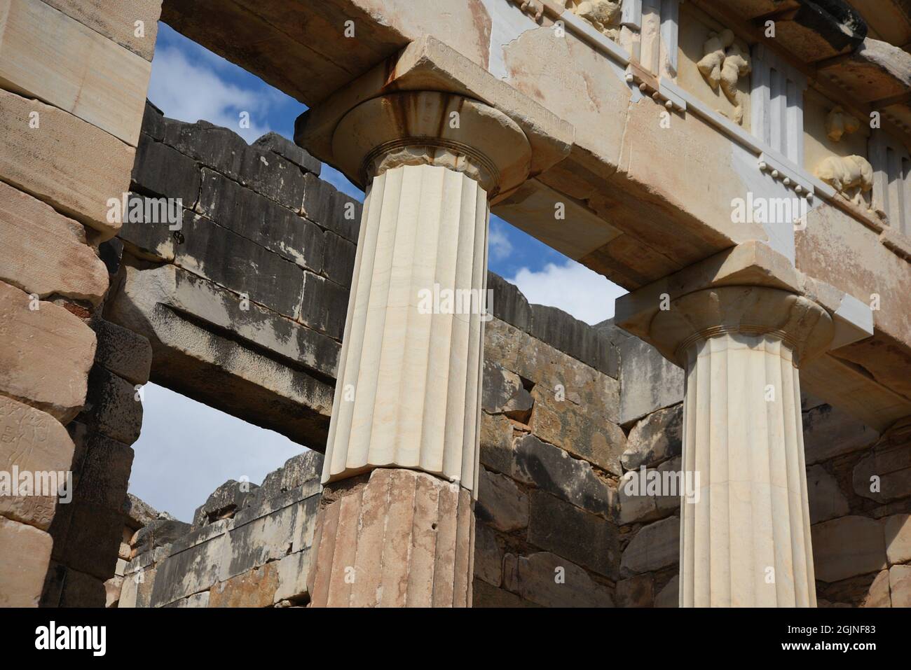 Marble sculpted triglyph, metope and columns of the Doric order ...