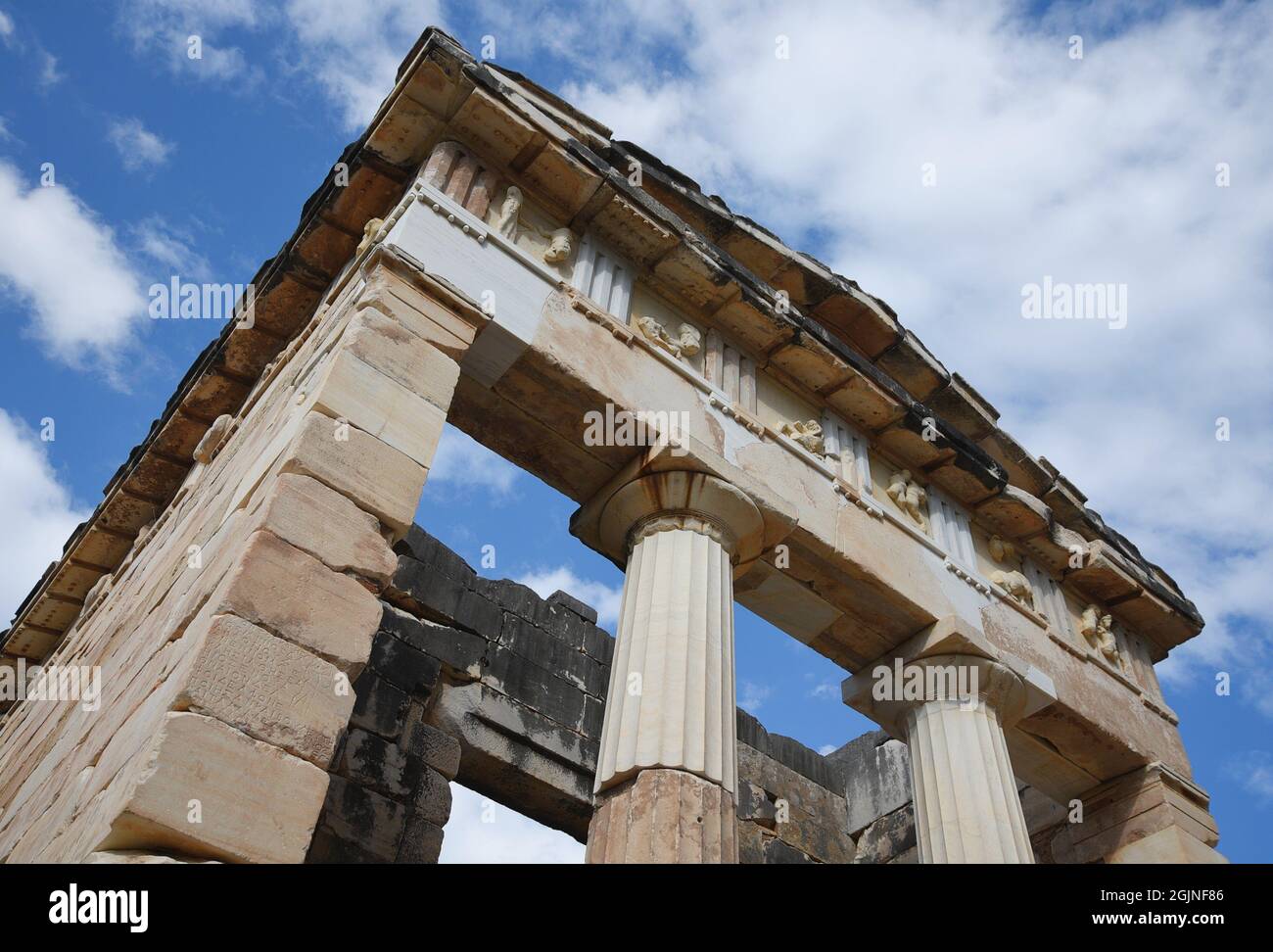 Marble sculpted triglyph, metope and columns of the Doric order ...