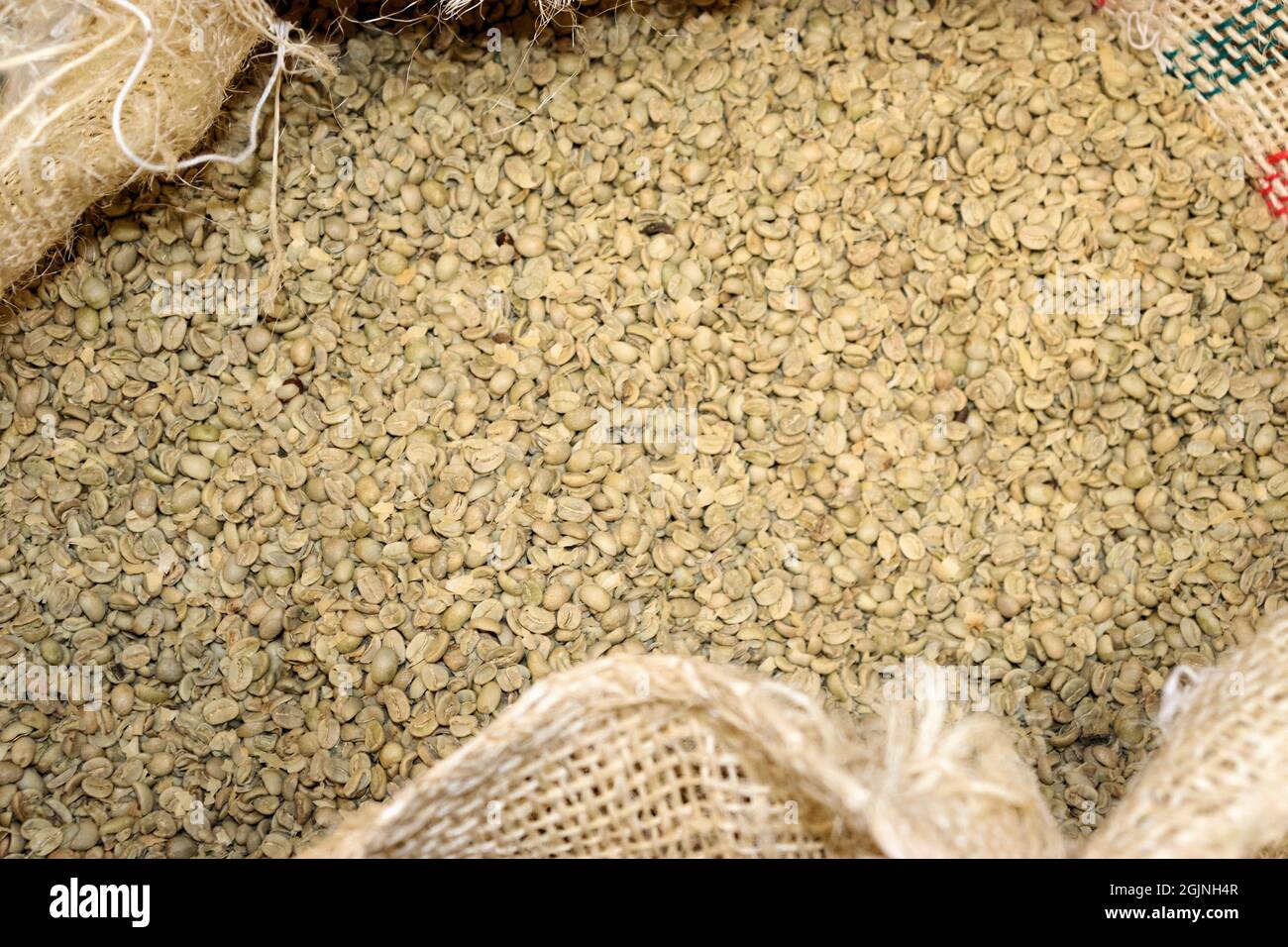 Roasted coffee, coffee factory, coffee roast in a machine Stock Photo ...