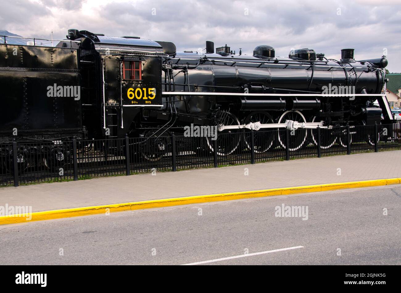 Antique black colored steam train in Jasper Canada Stock Photo - Alamy