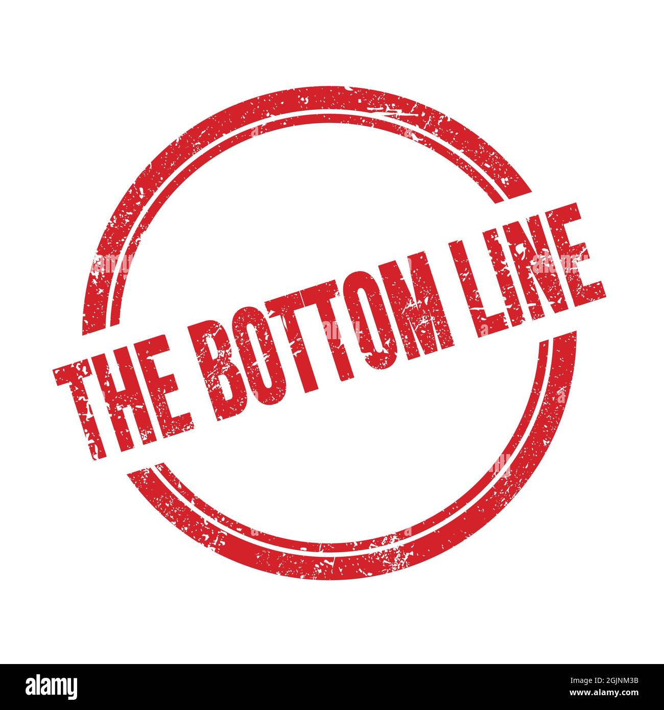 THE BOTTOM LINE text written on red grungy vintage round stamp Stock ...