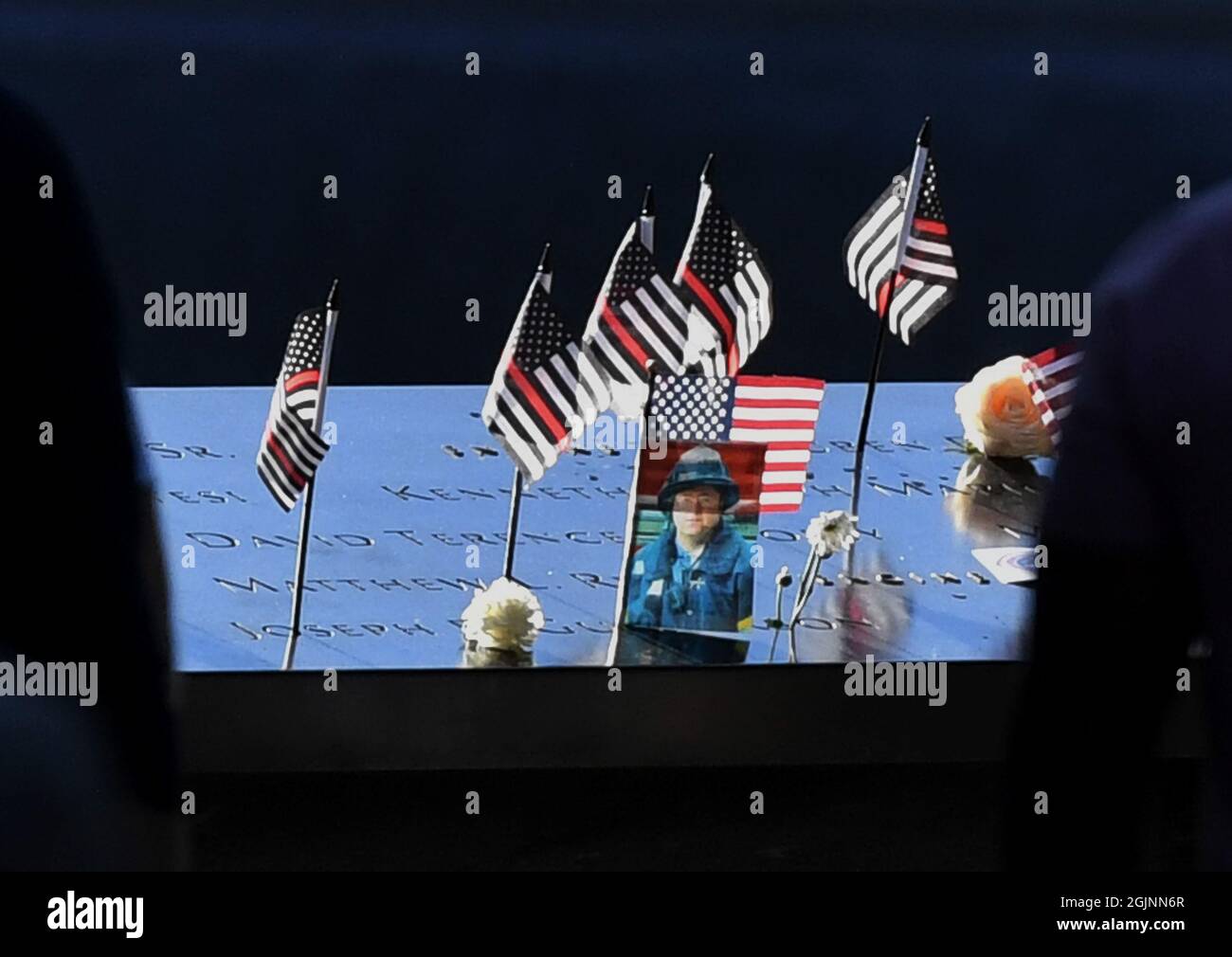 Firefighters from FDNY Engine Company 217, Brooklyn, salute near the ...