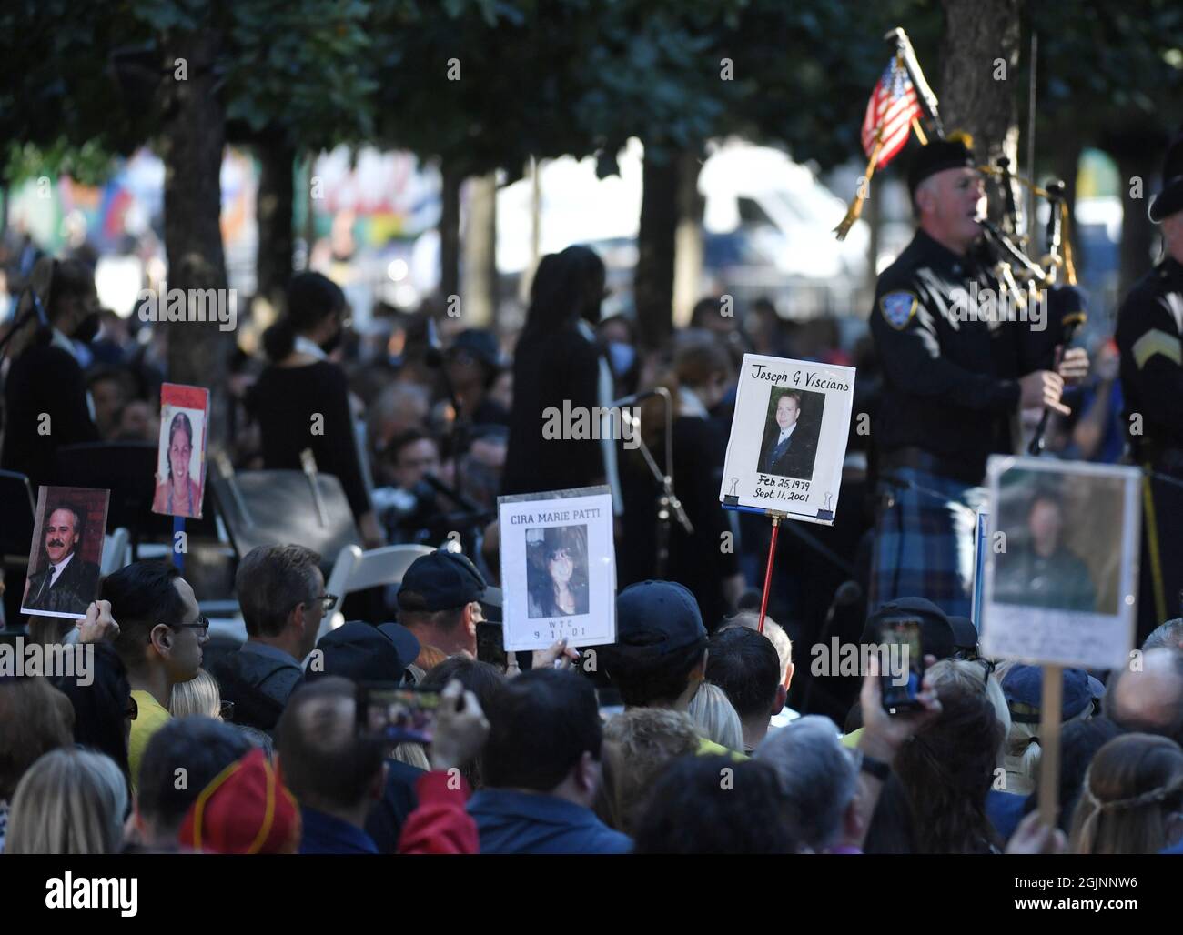 New York, USA. 11th Sep, 2021. The photos of 9/11 victims are carried ...