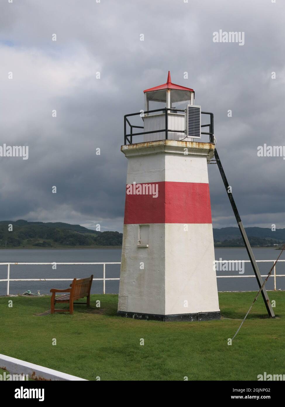 The red & white striped lighthouse at the western entrance to the ...