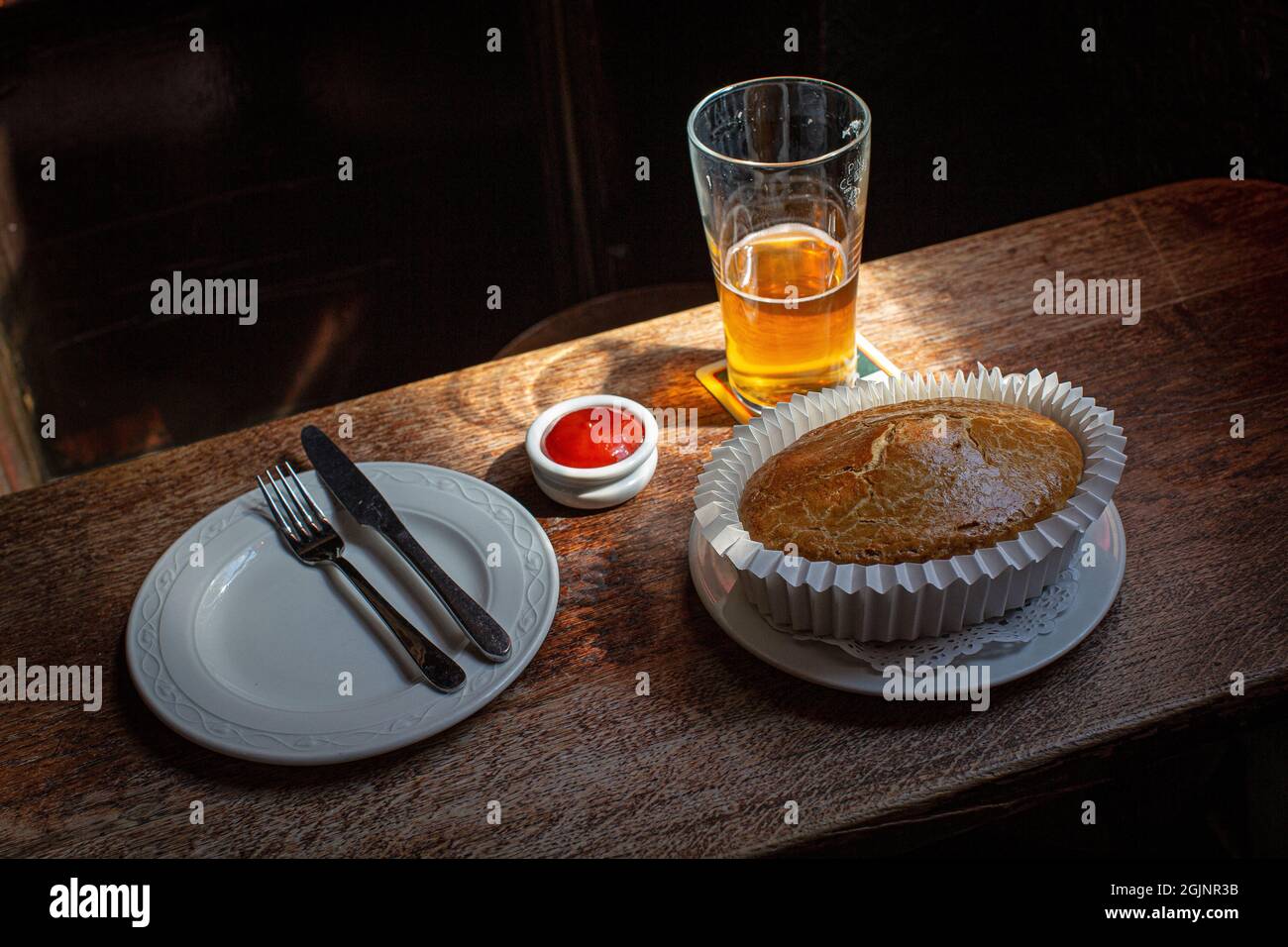 Classic British meal with pie with ale at the Guinea Grill in Mayfair ...