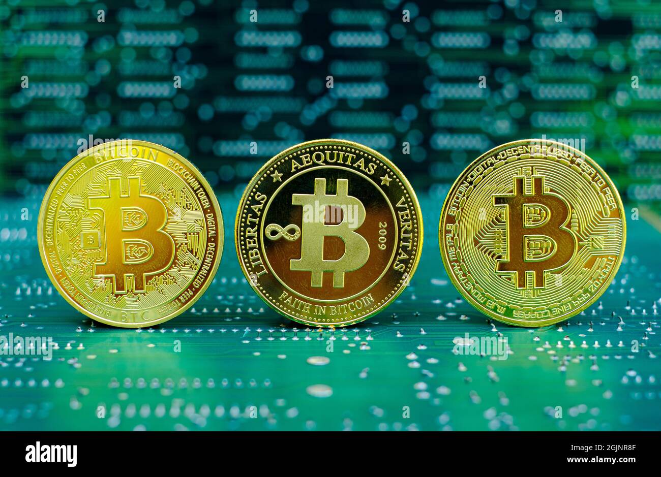 Golden bitcoin cryptocurrency old and new version on computer ...