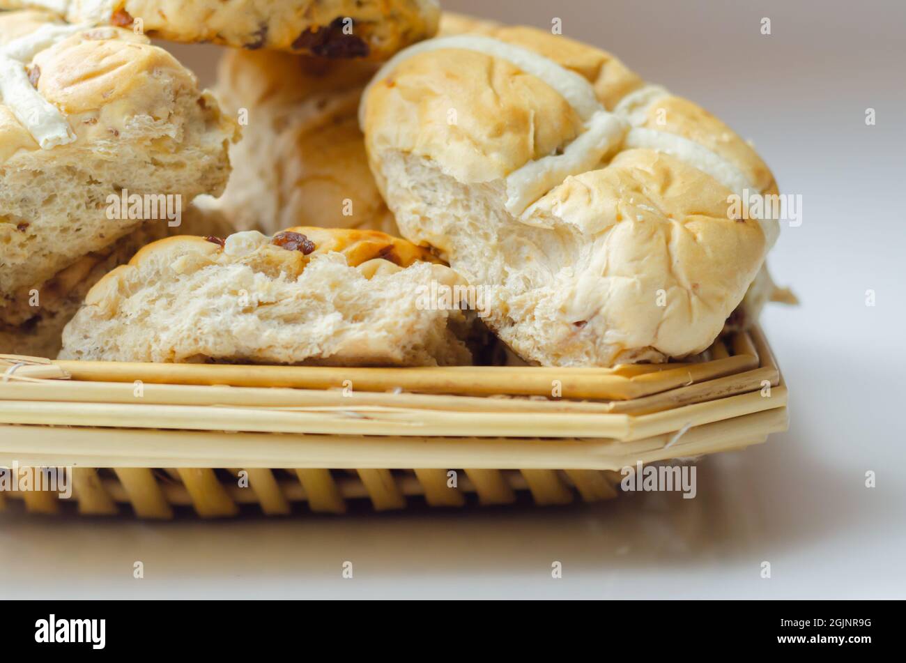 Traditional hot cross buns, bread with characteristic decoration in the ...