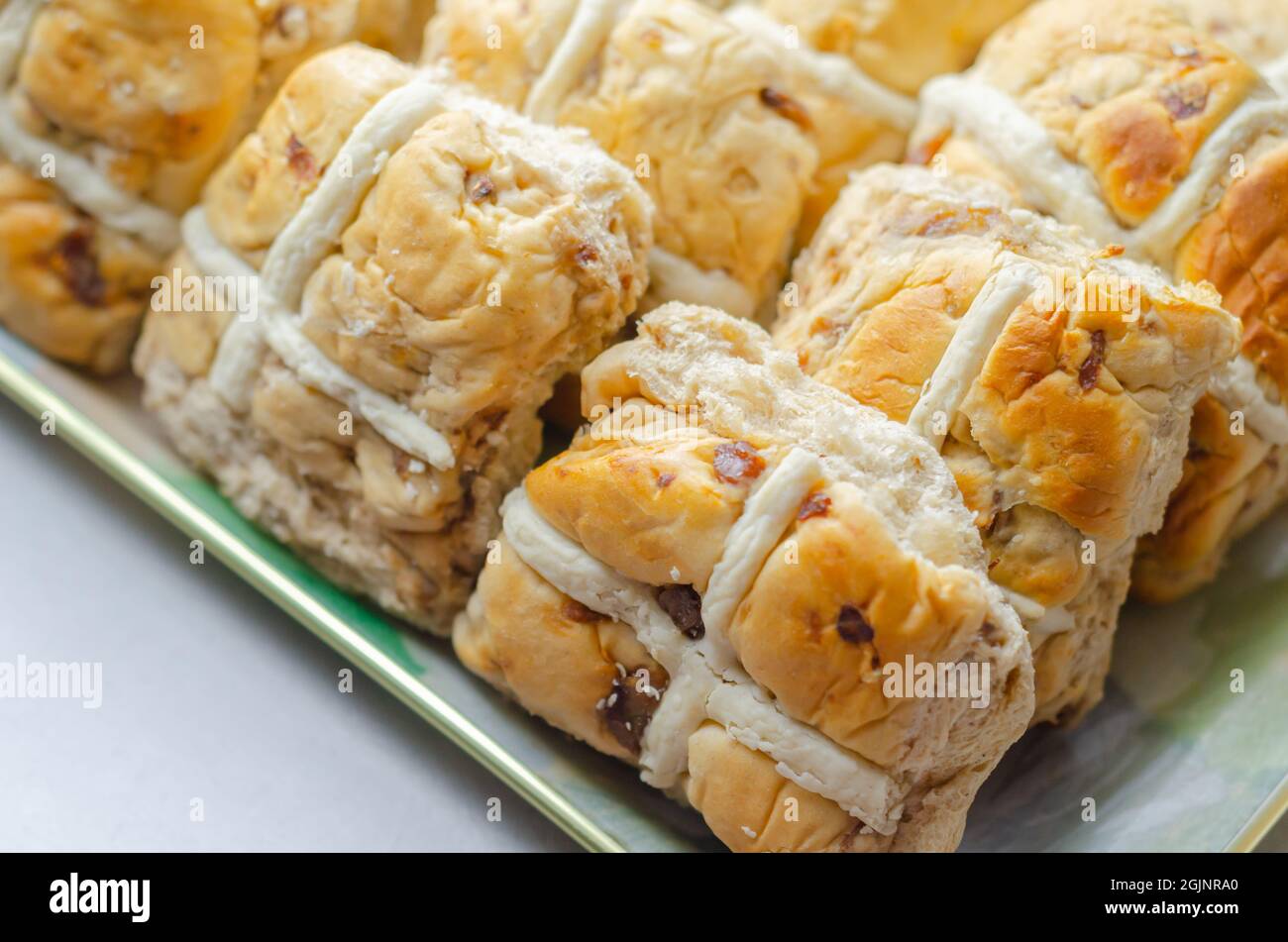 Traditional hot cross buns, bread with characteristic decoration in the ...