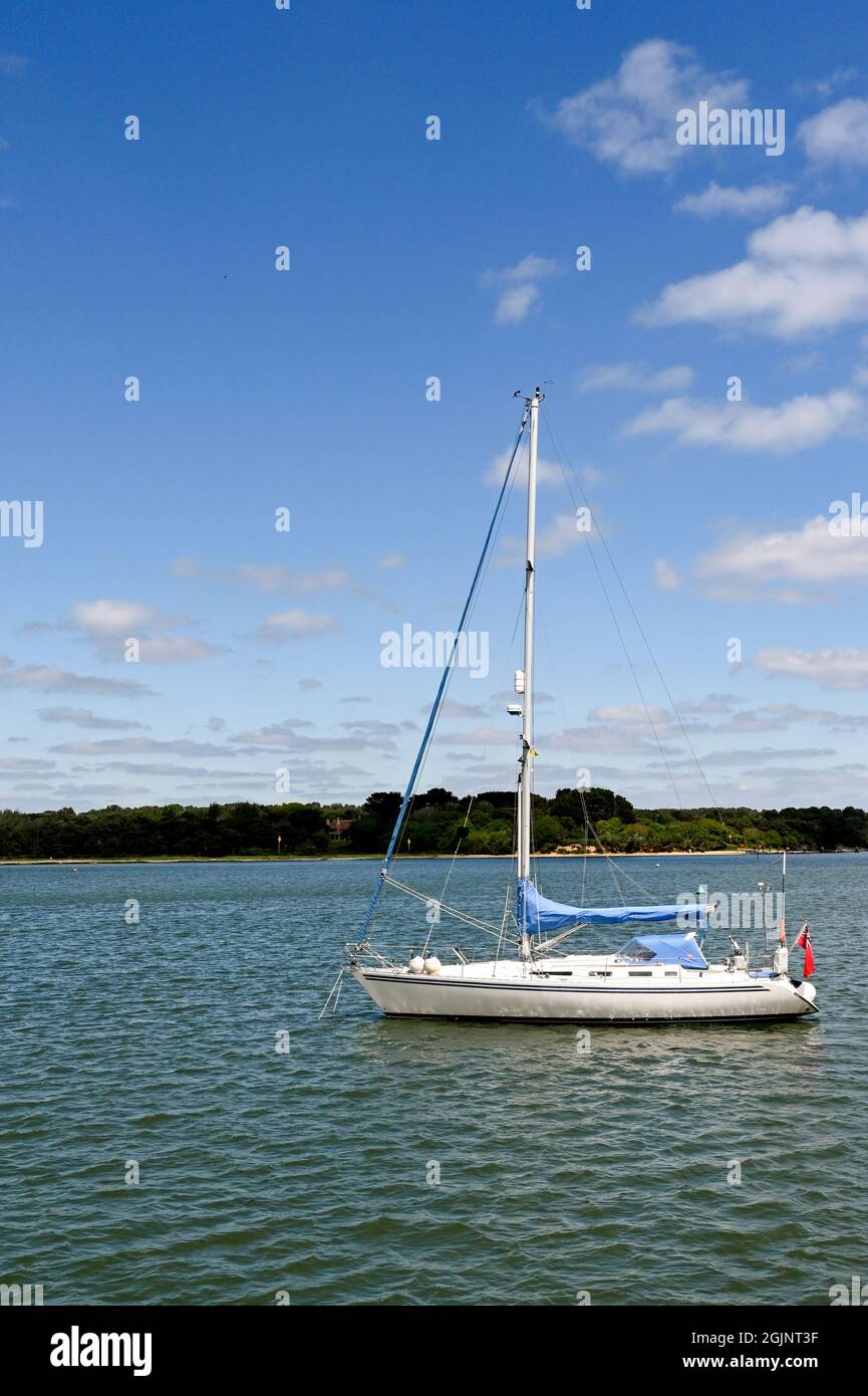 Poole, Dorset, England - June 2021: Sailing boat at anchor in Poole ...