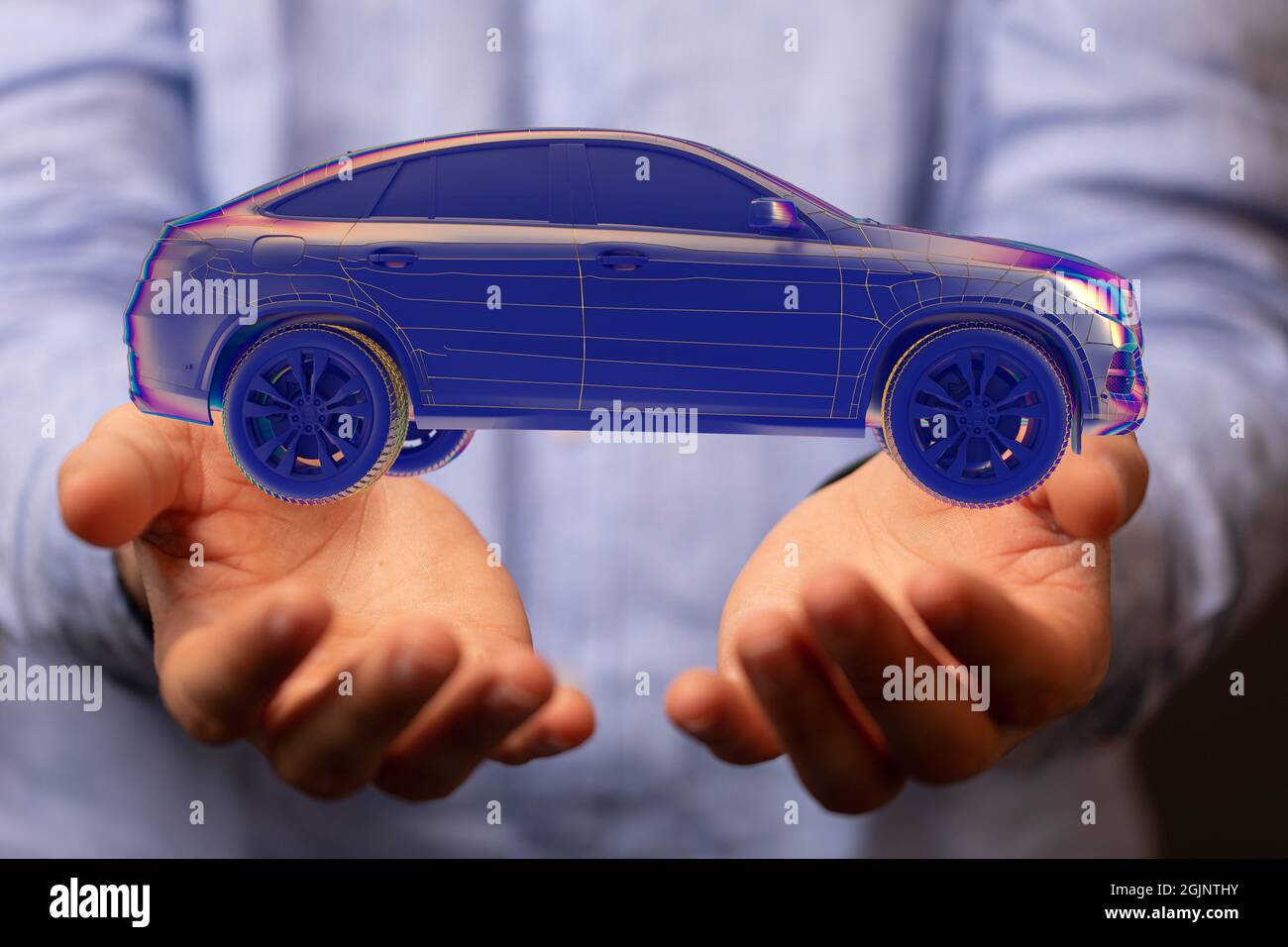 Closeup shot of a blue digital car above a hand Stock Photo - Alamy