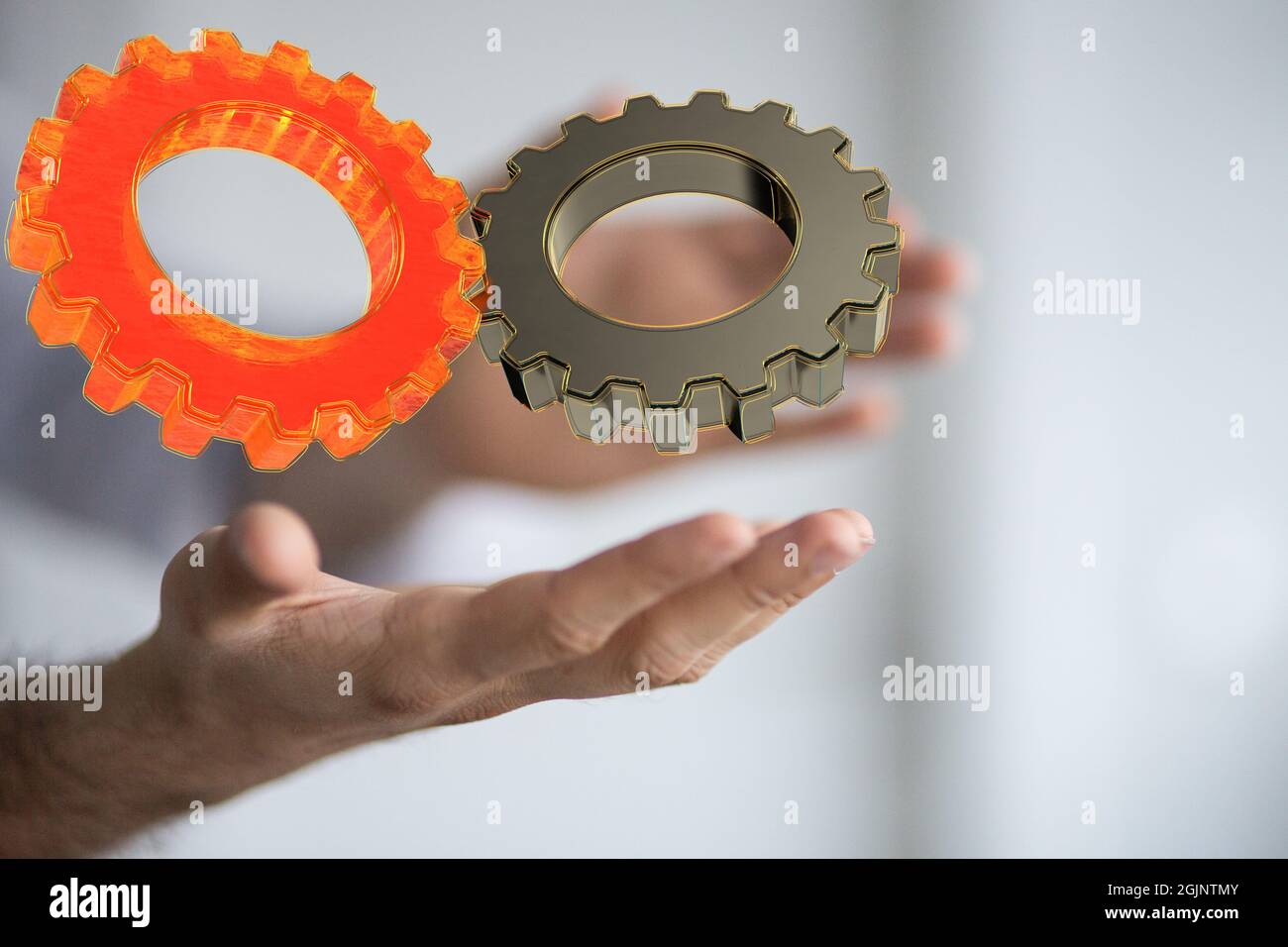 Closeup shot of digital ratchet wheels above hands Stock Photo - Alamy