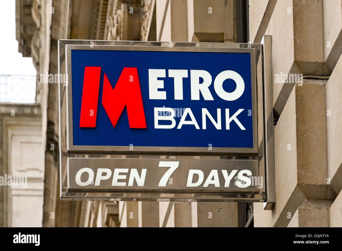 London, England - August 2021: Sign above the entrance to a branch of ...